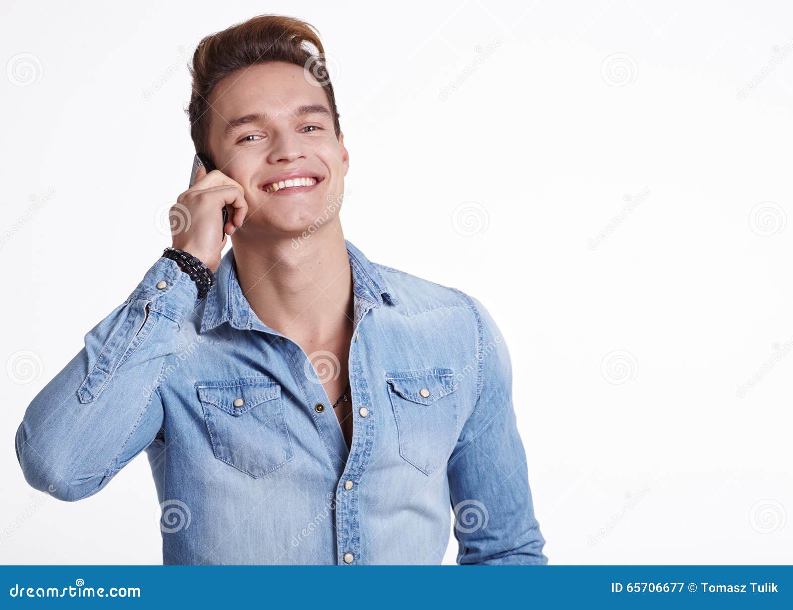 Happy Young Man Using Mobile Phone Isolated on White Background Stock ...