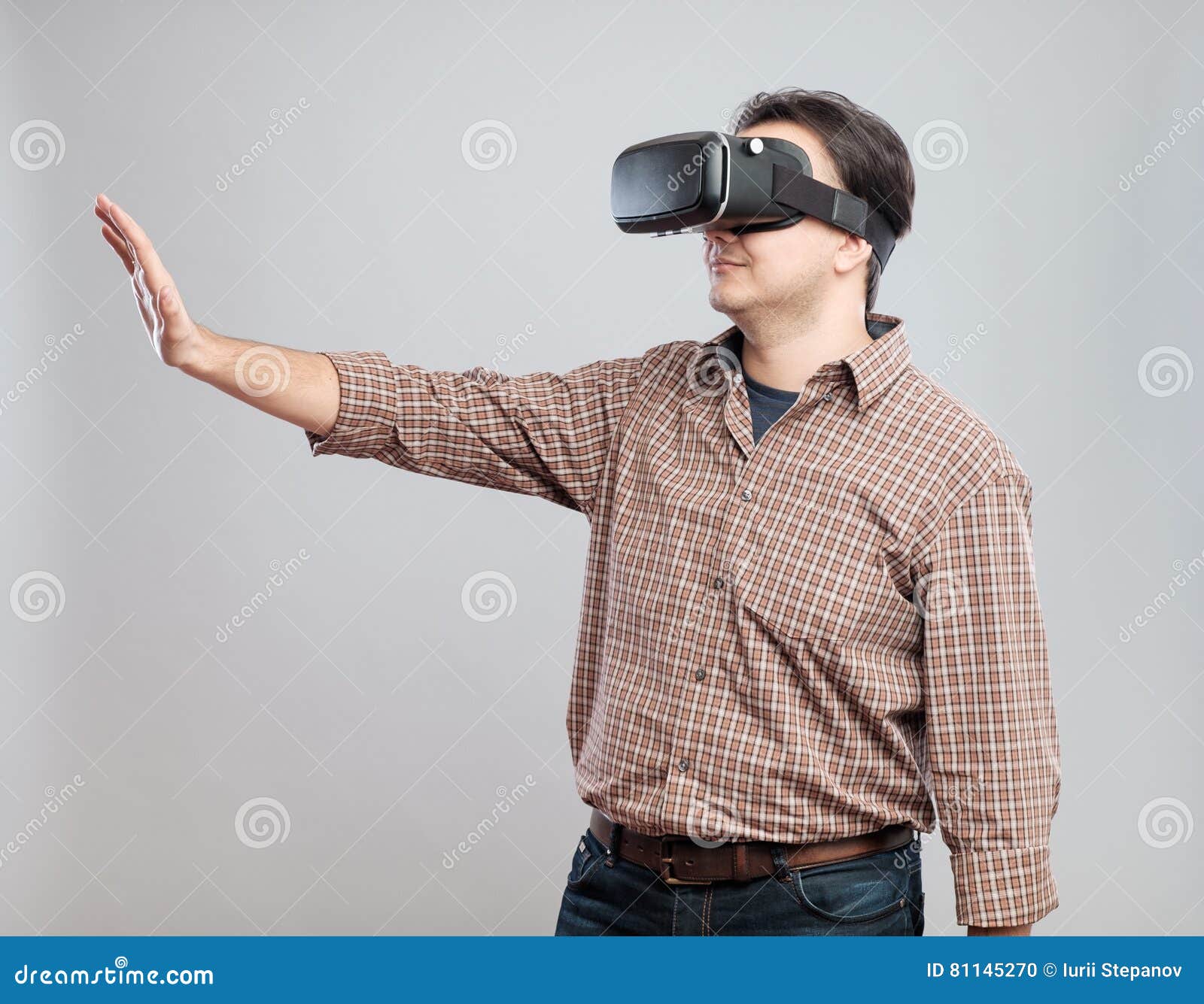Happy Young Man Using Virtual Reality Headset Stock Photo - Image of ...