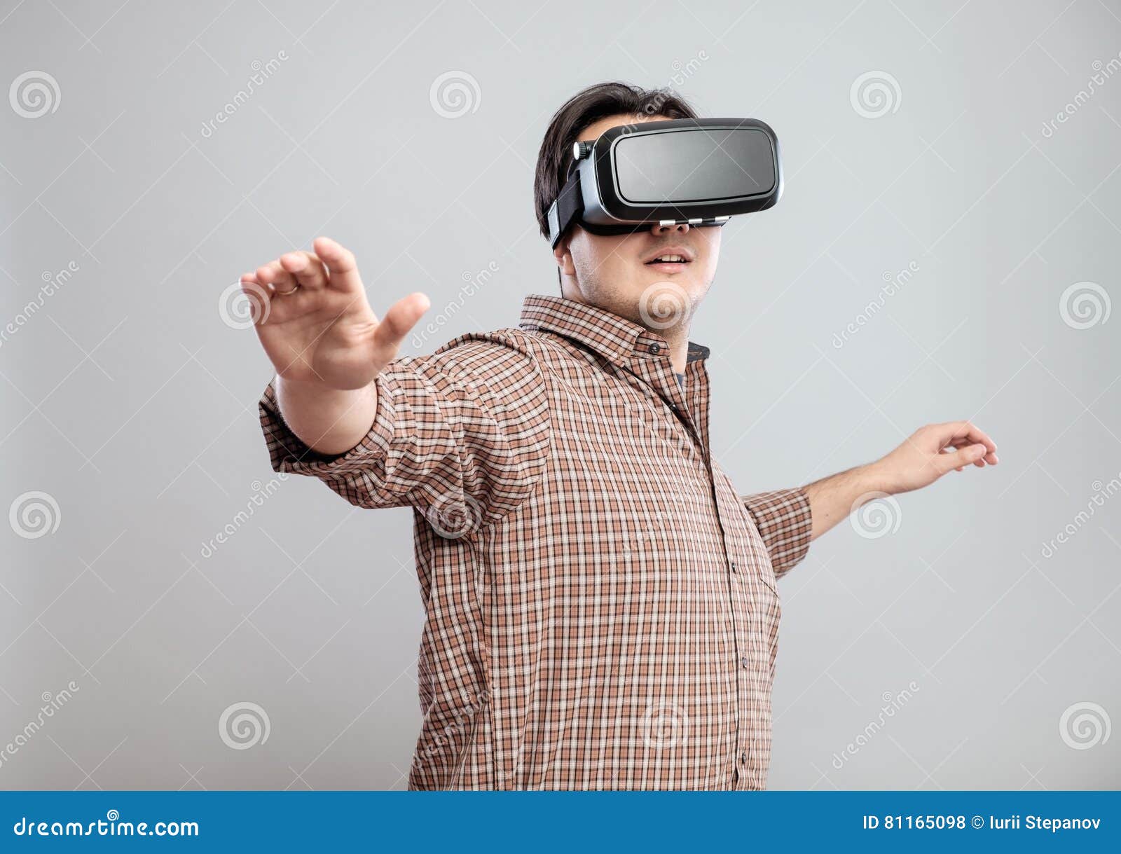 Happy Young Man Using Virtual Reality Headset Stock Photo - Image of ...