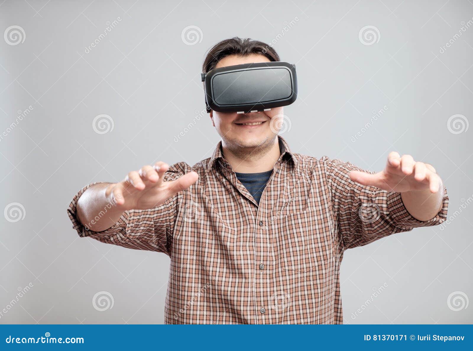 Happy Young Man Using Virtual Reality Headset Stock Image - Image of ...