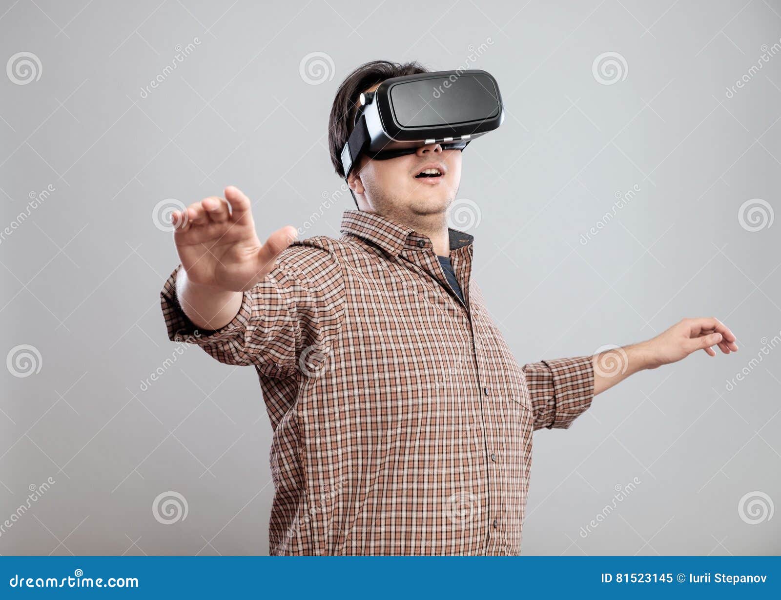 Happy Young Man Using Virtual Reality Headset Stock Image - Image of ...