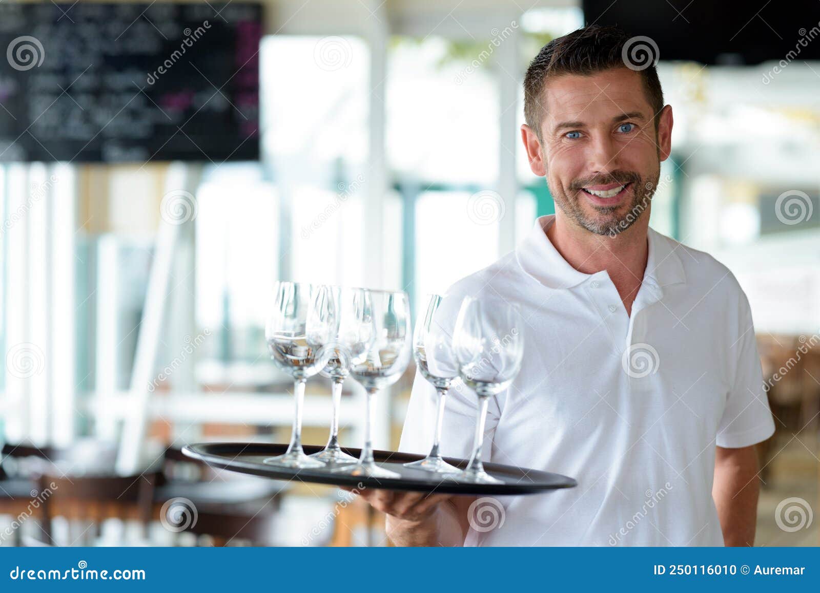 Happy Young Man Waiter with Glasses Stock Photo - Image of service ...