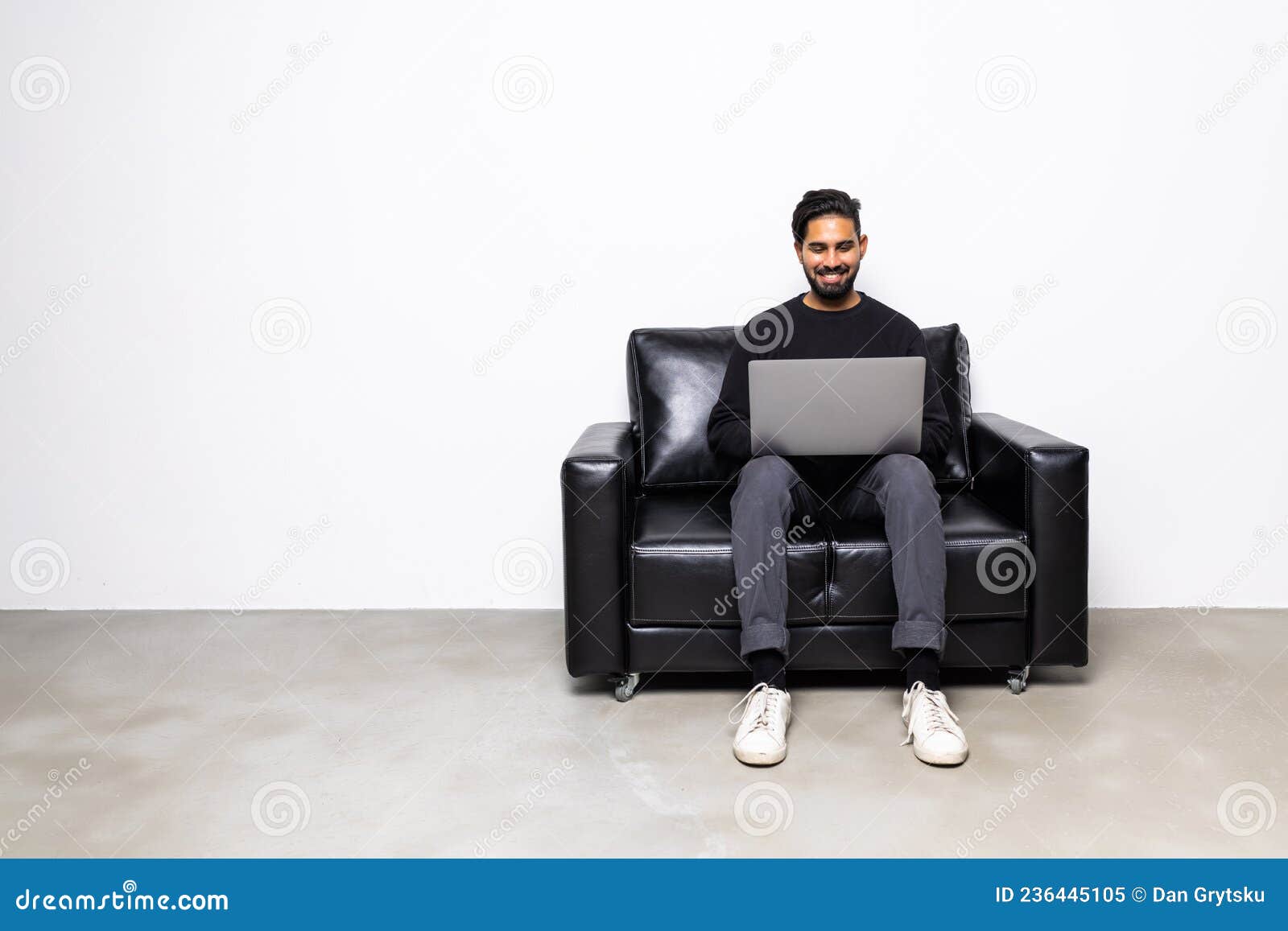 Happy Young Man Watching and Working on Computer Laptop at Home Stock ...