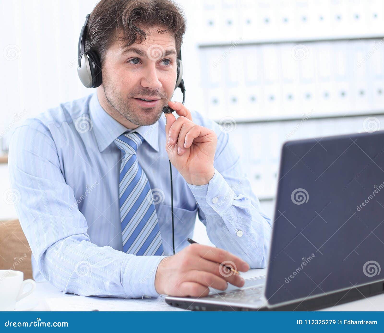 Happy Young Man Working at Callcenter, Using Headset Stock Image ... Happy Young Man Working at Callcenter, Using Headset Stock Image ...