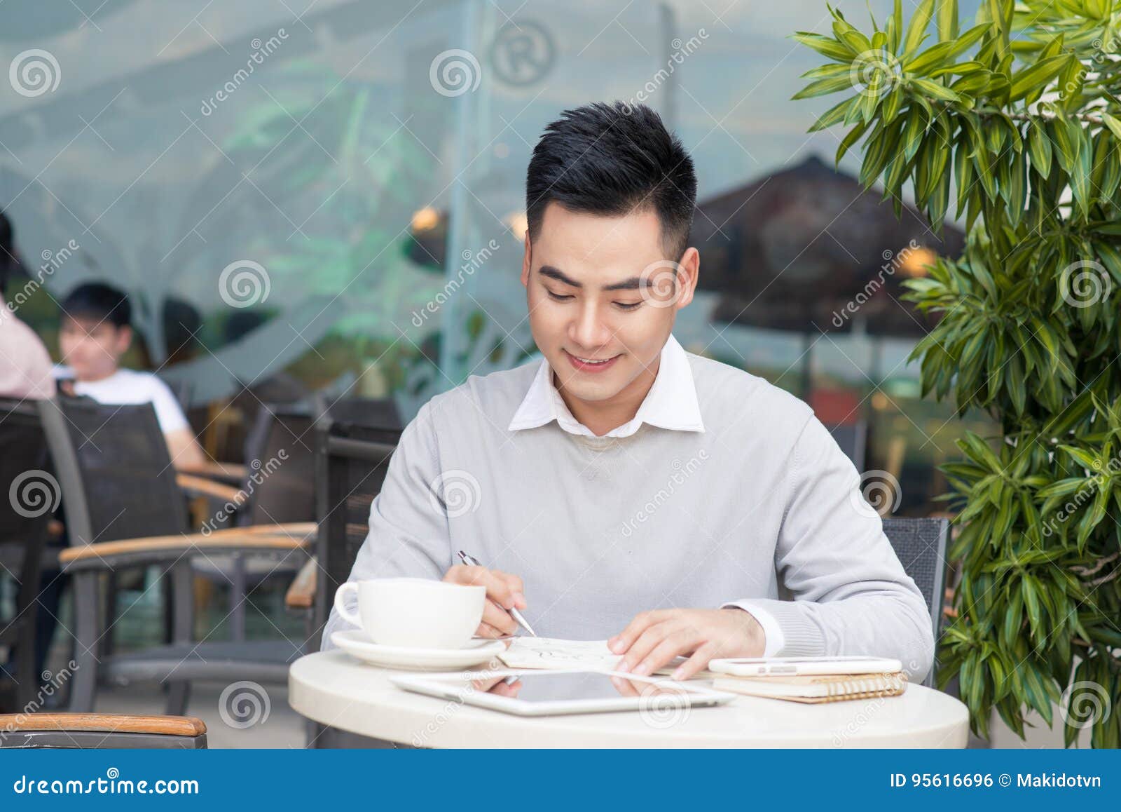 Happy Young Man Working on Laptop Computer during Coffee Break I Stock ...
