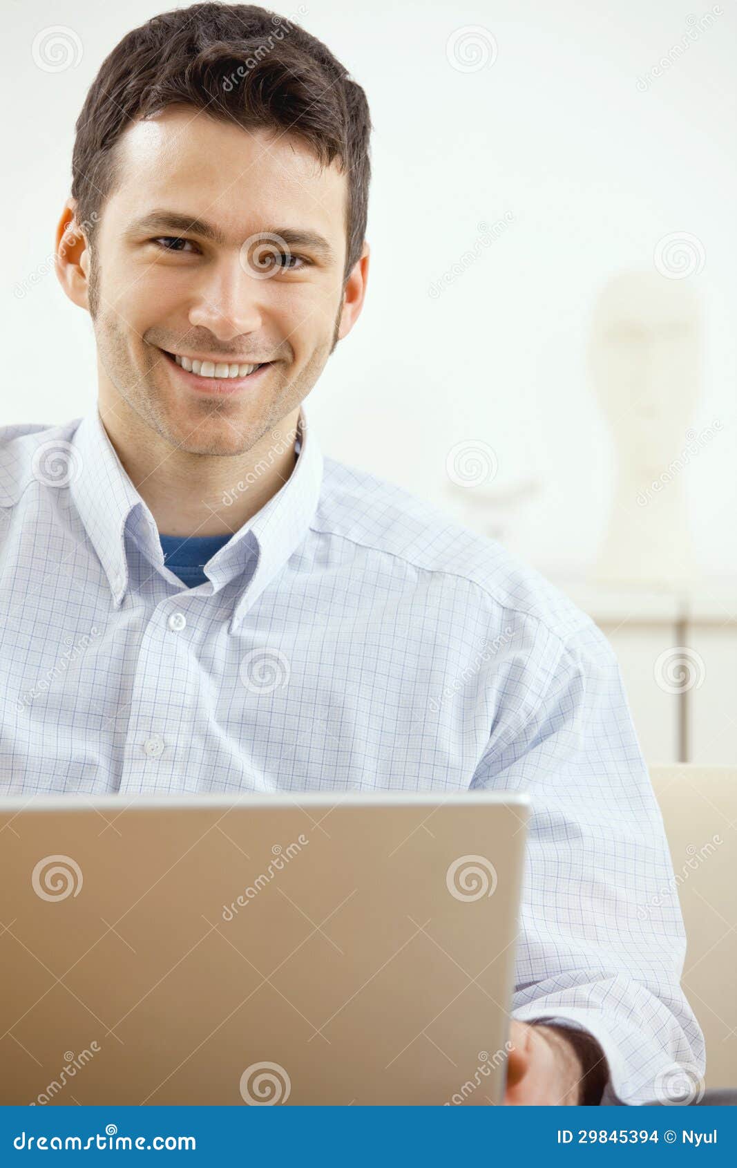 Happy man using laptop stock photo. Image of interior - 29845394