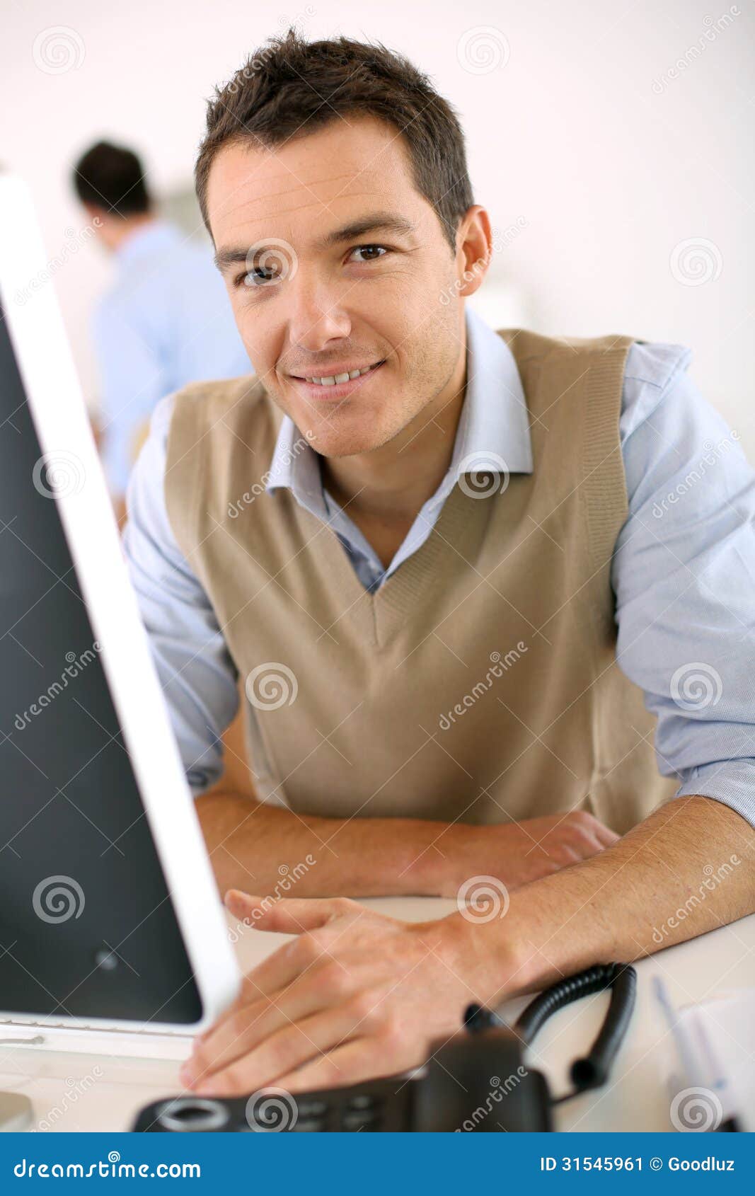 Happy Young Man Working in Office Stock Image - Image of employee ...