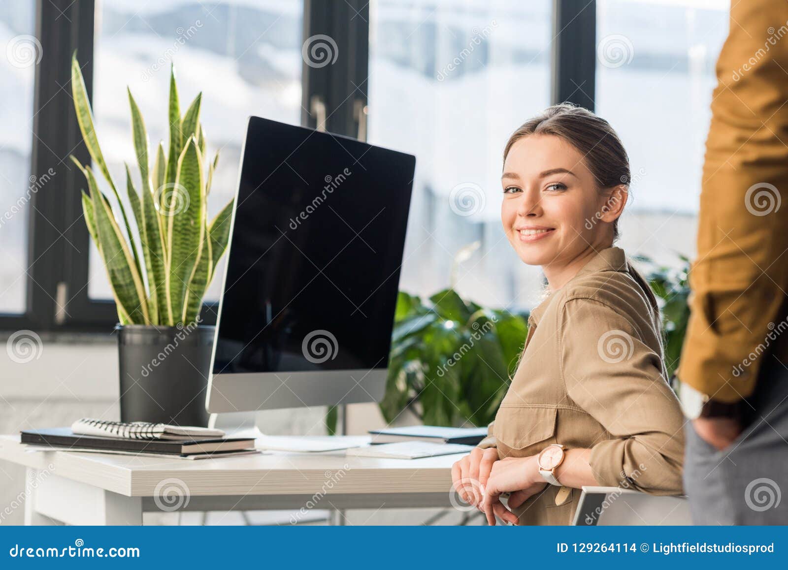 Happy Young Manageress Sitting Stock Photo - Image of alone ...