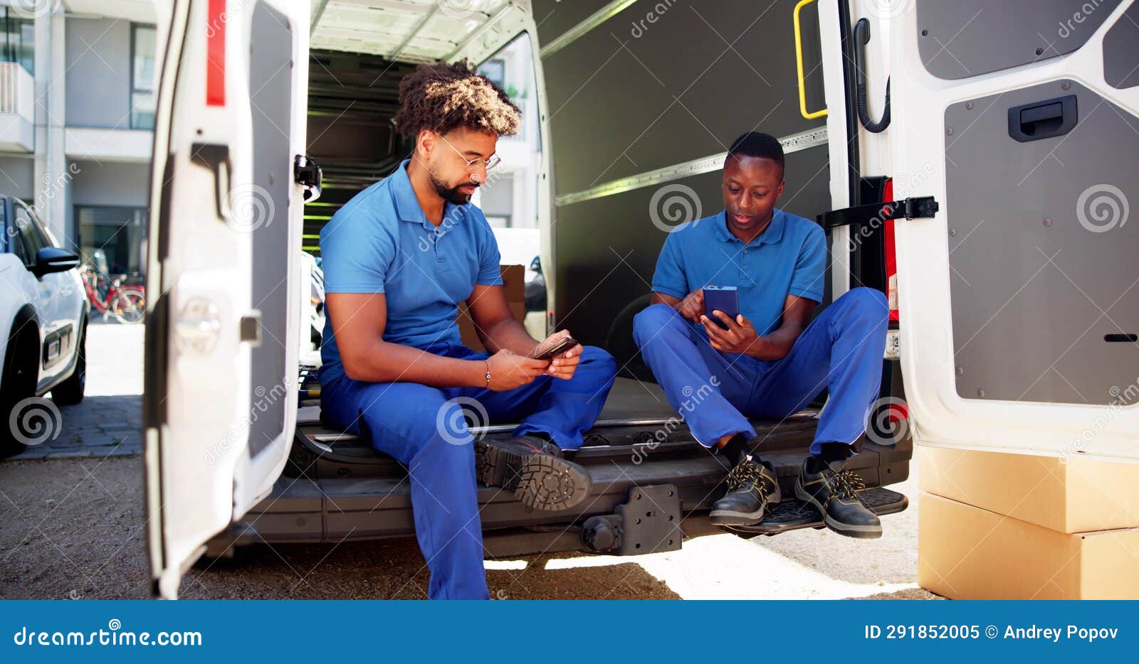 Happy Young Movers and Van Truck Stock Image - Image of boxes, street ...