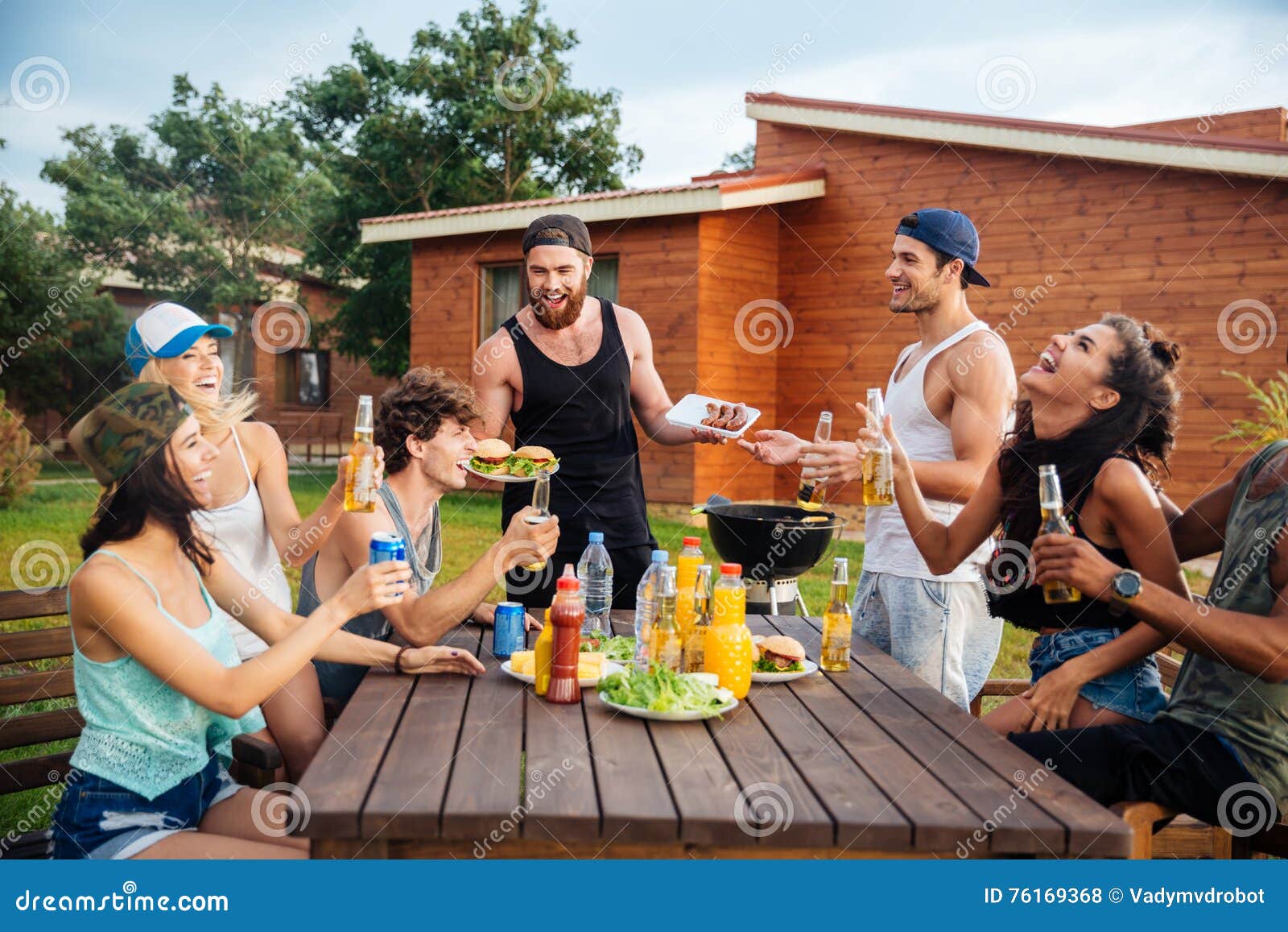 Happy Young People Laughing and Having Fun on Barbeque Party Stock ...
