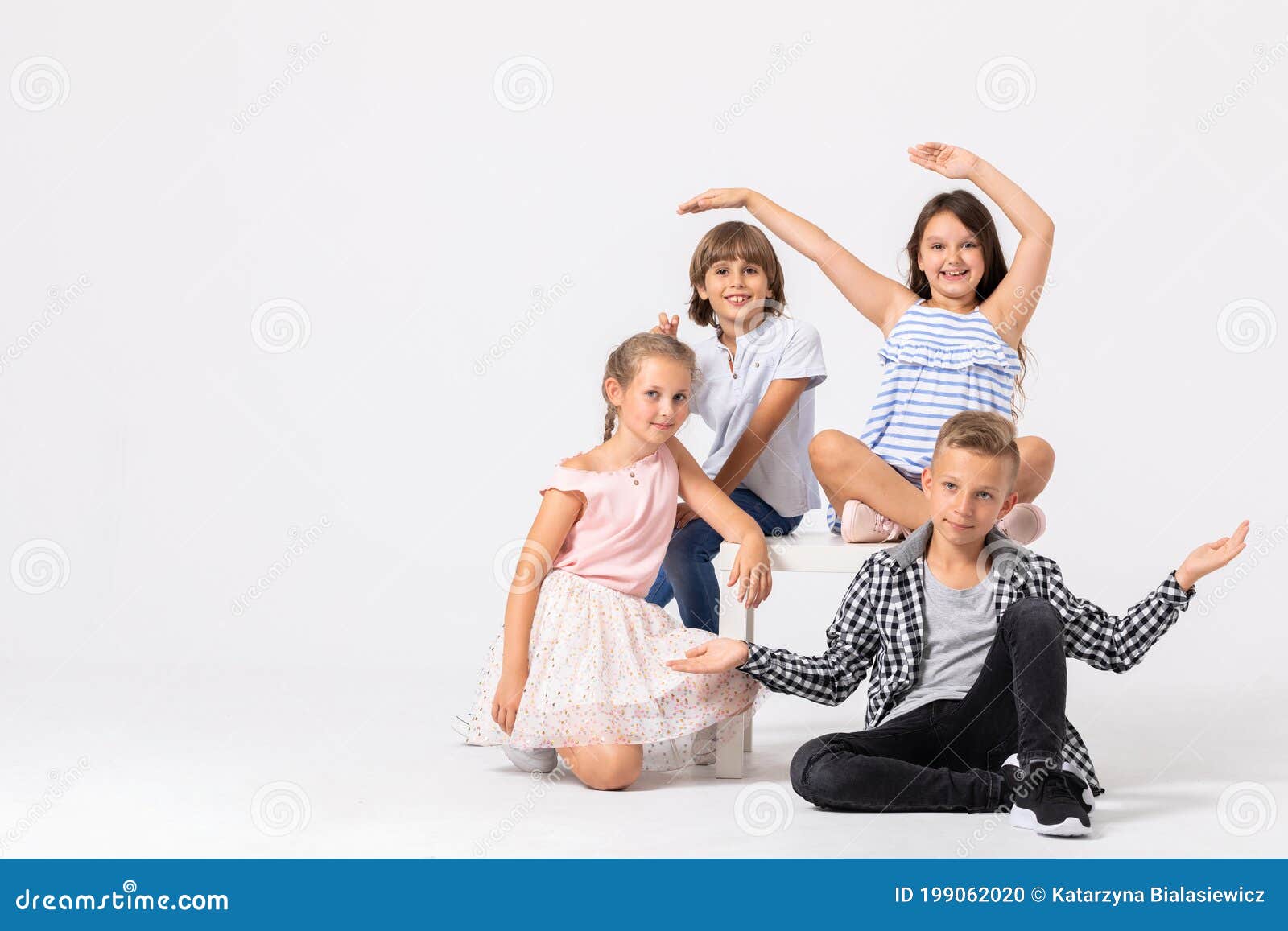 Young People Playing Together, Copy Space on Empty White Wall Stock ...