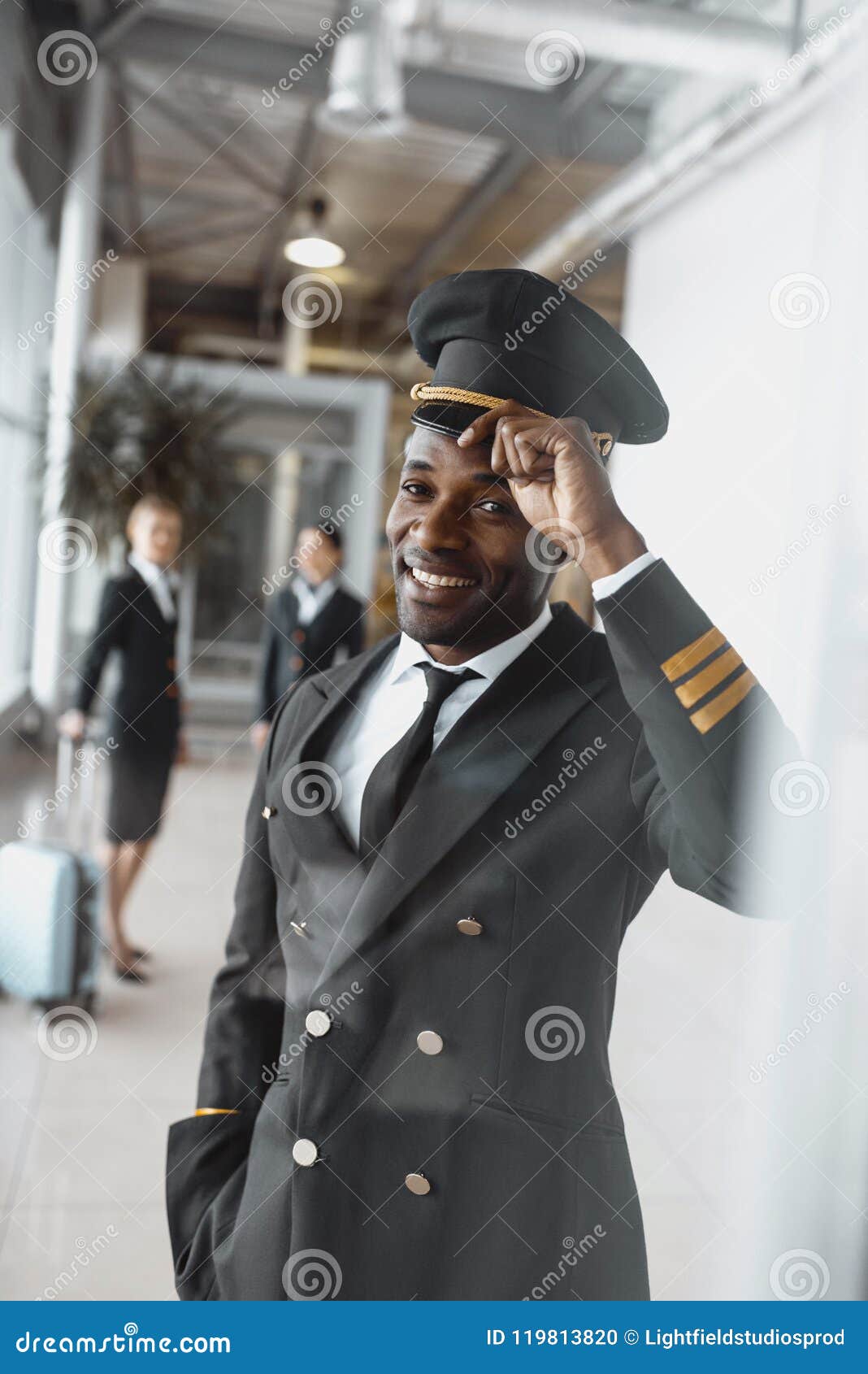Happy Young Pilot in Airport Looking Stock Photo - Image of station ...