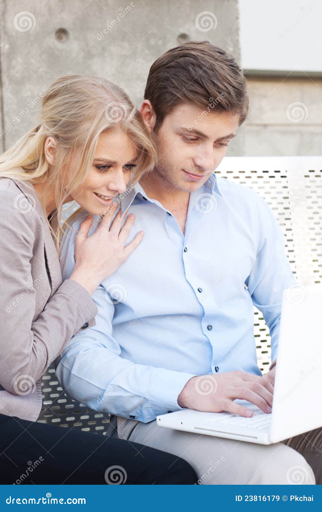 Happy, Young Professional Couple Using Laptop Stock Image - Image of ...