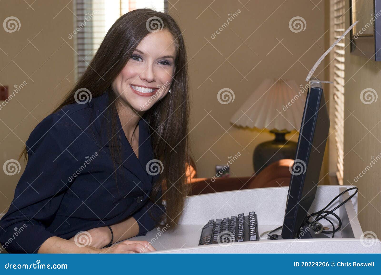Happy Young Female Hotel Receptionist Stock Photo - Image of ...