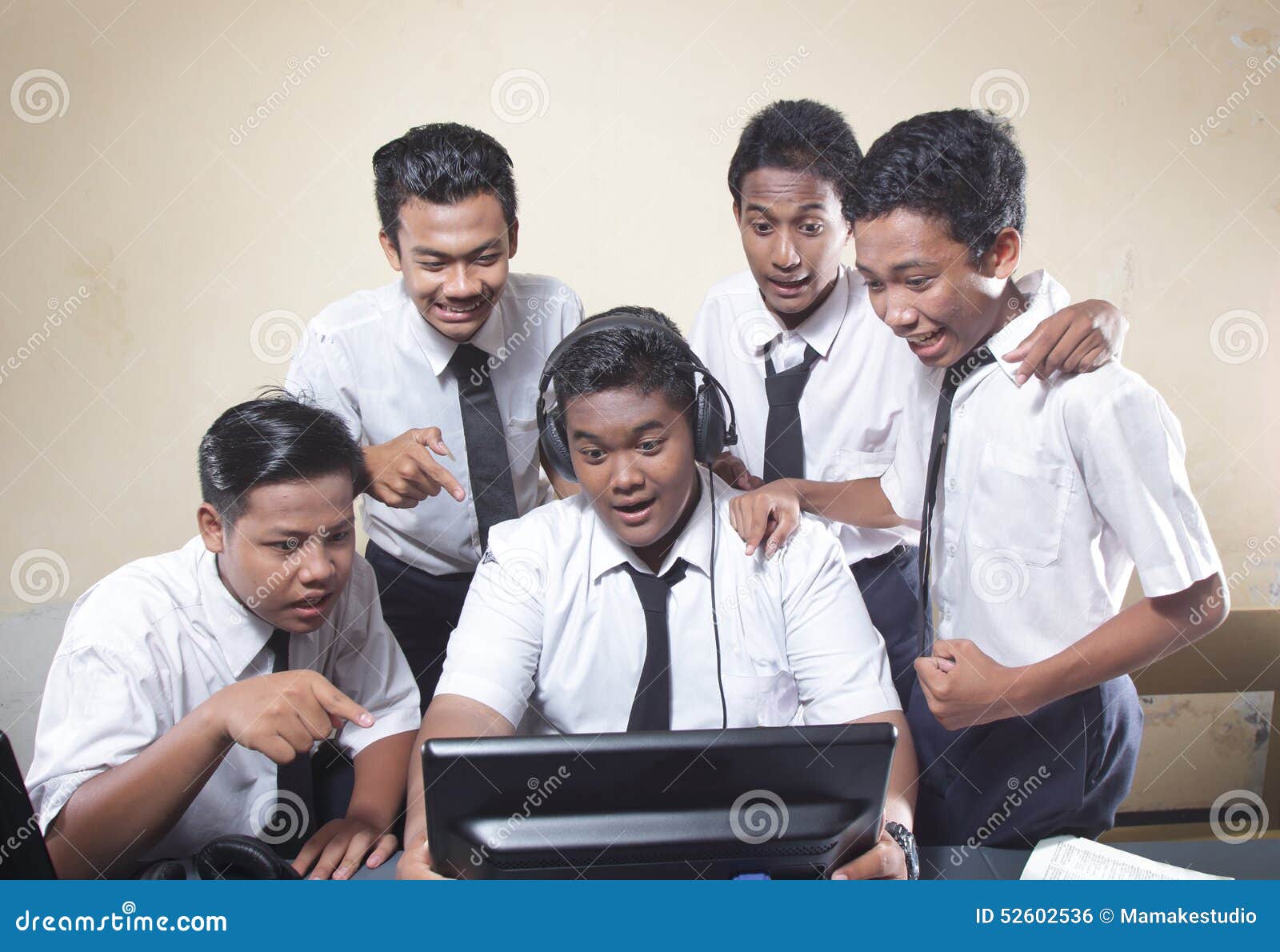 Happy Young Students are Gather for Studying Internet Communication ...