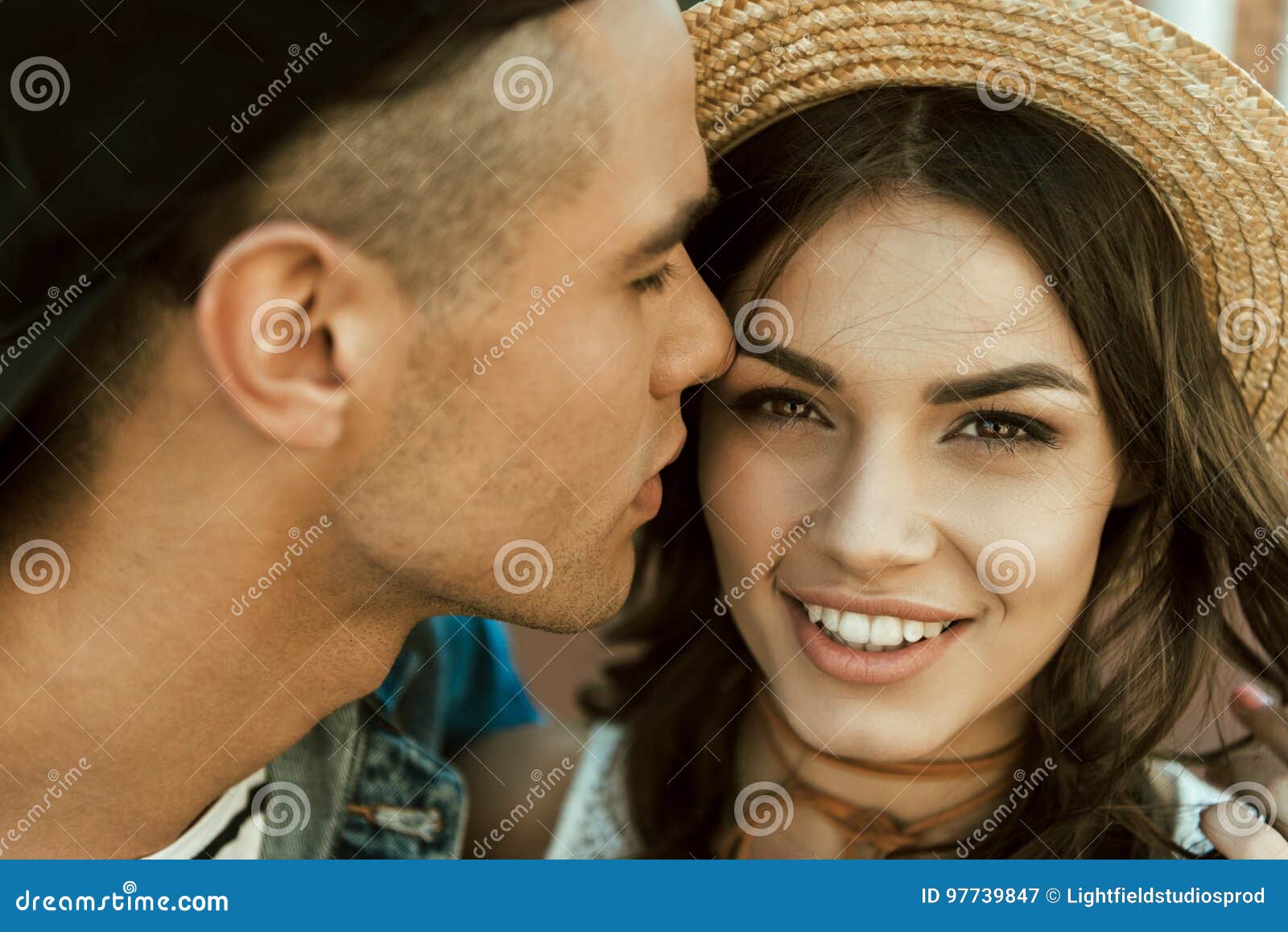 Happy Young Stylish Couple Hugging and Looking at Camera Stock Image ...