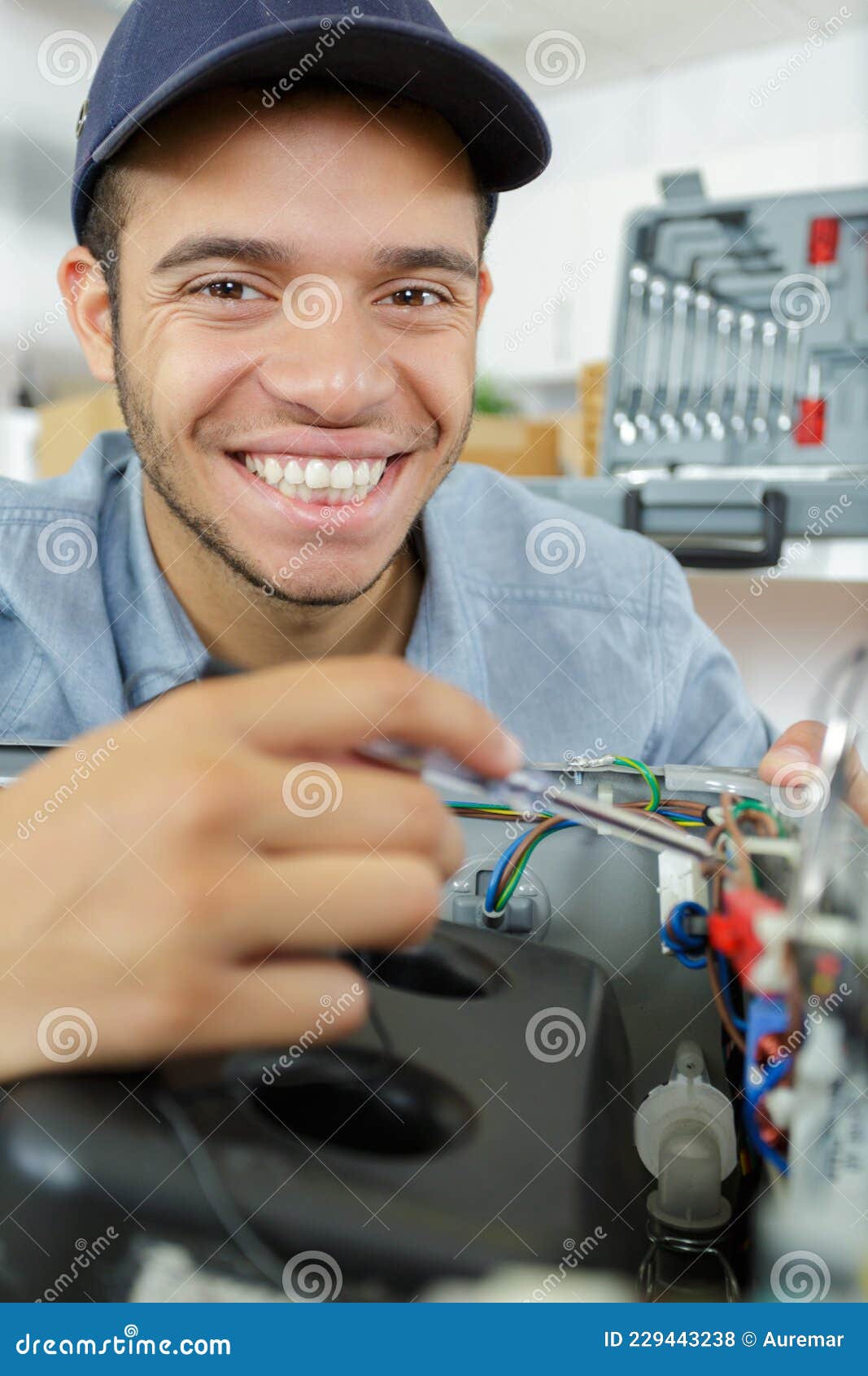 Happy Young Technician at Work Stock Photo - Image of room, person ...