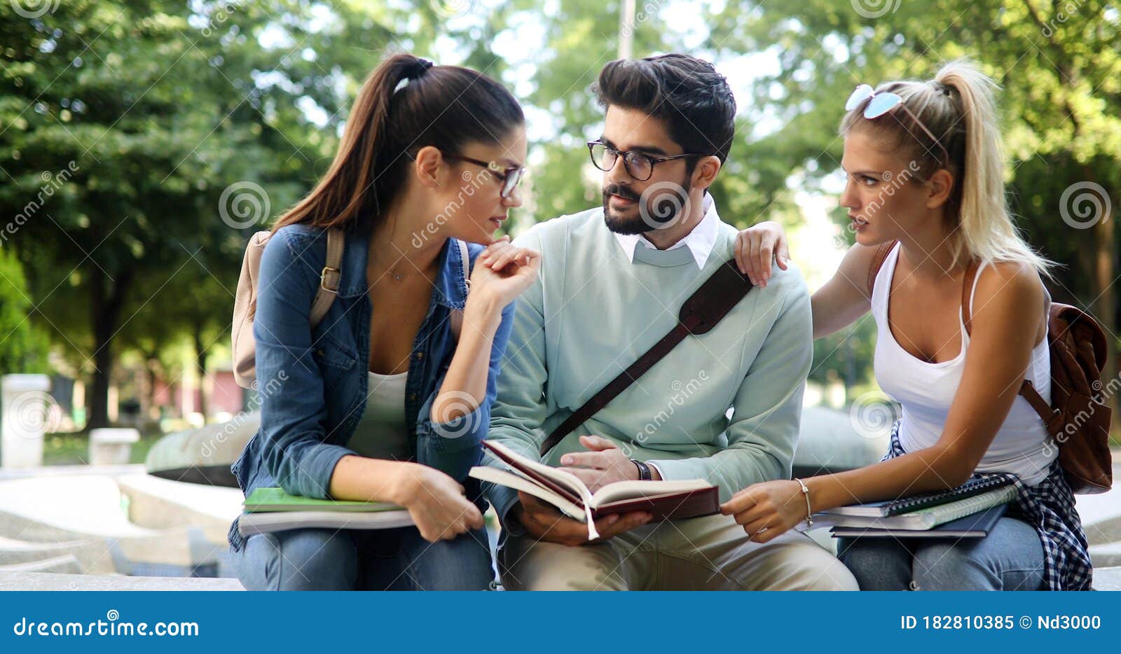 Happy Young University Students Friends Studying with Books at ...