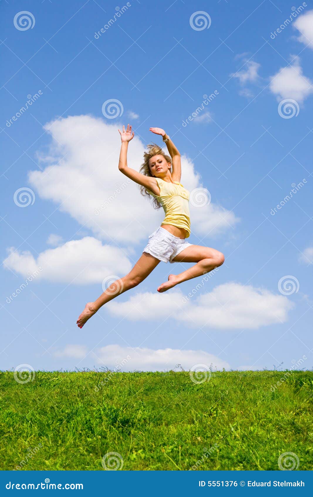 Happy Young Woman is Dancing in a Field Stock Photo - Image of ...