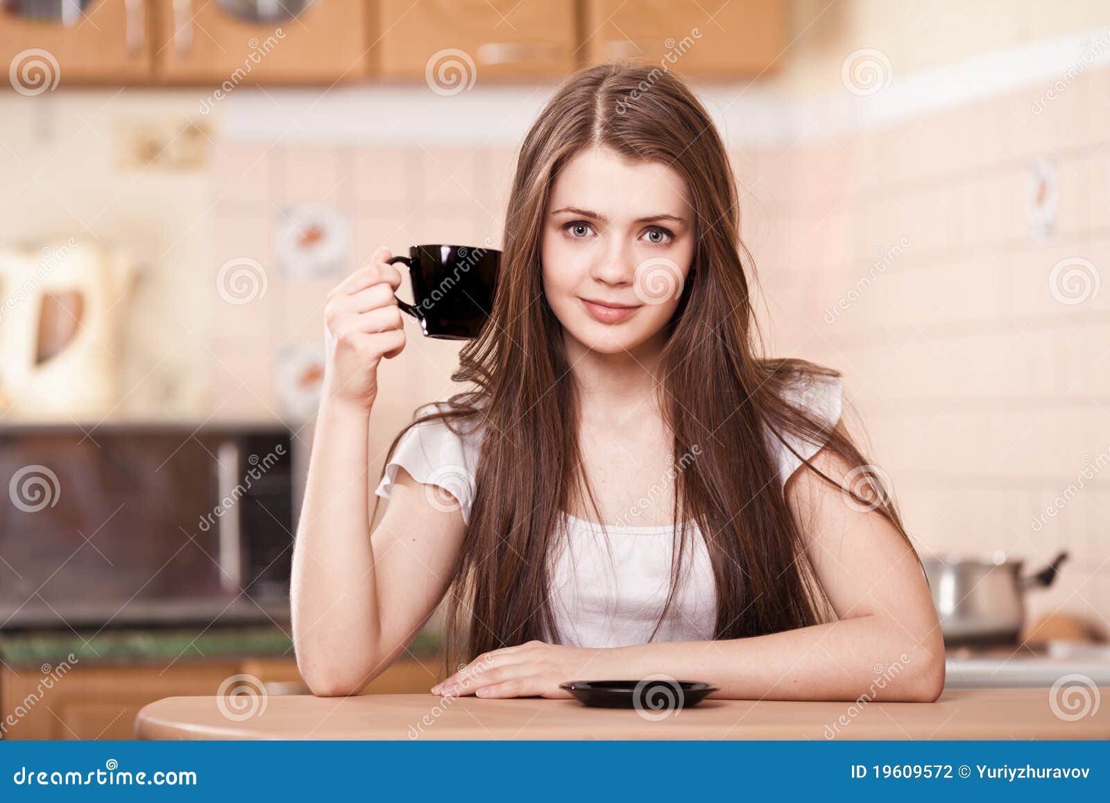 Happy Young Woman Drinking Coffee at Home Stock Photo - Image of ...