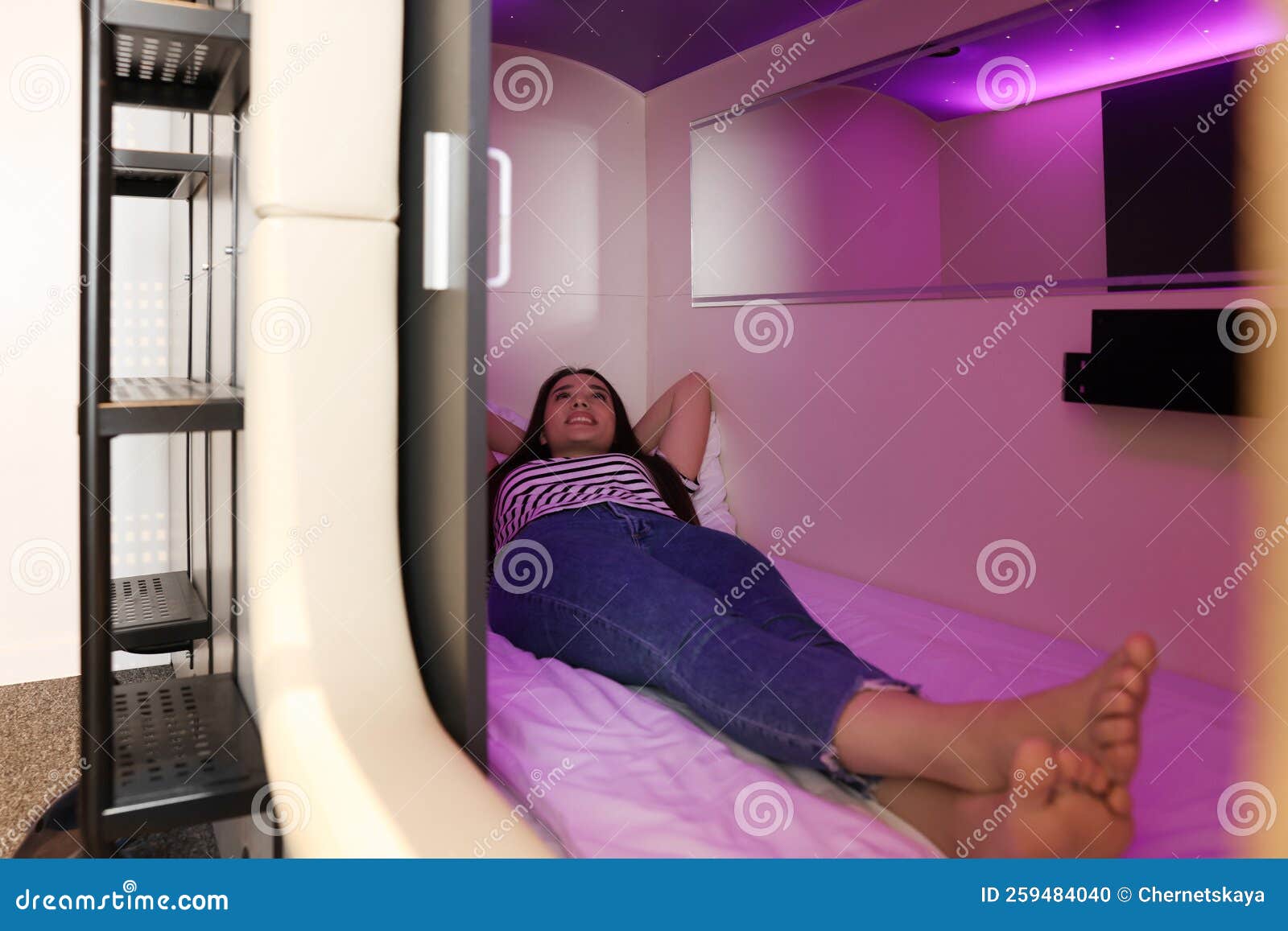 Happy Young Woman Lying in Capsule of Pod Hostel Stock Photo - Image of ...