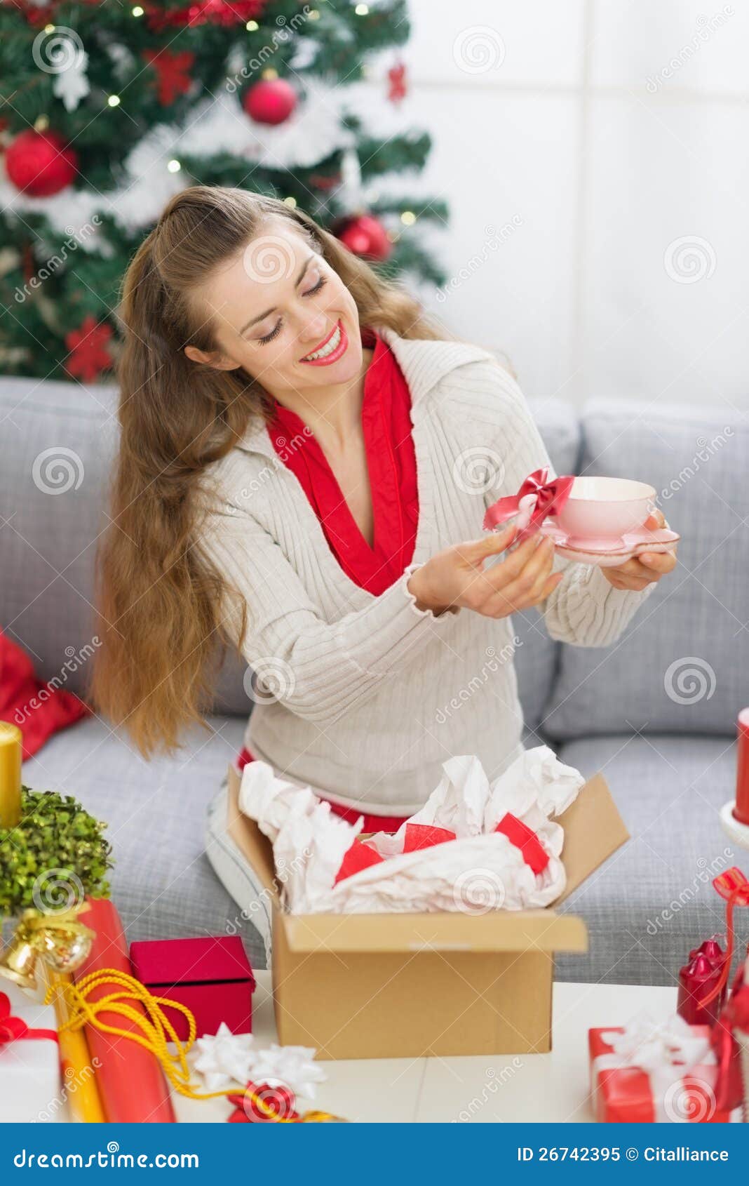 Happy Young Woman Packing Christmas Present Parcel Stock Image - Image ...