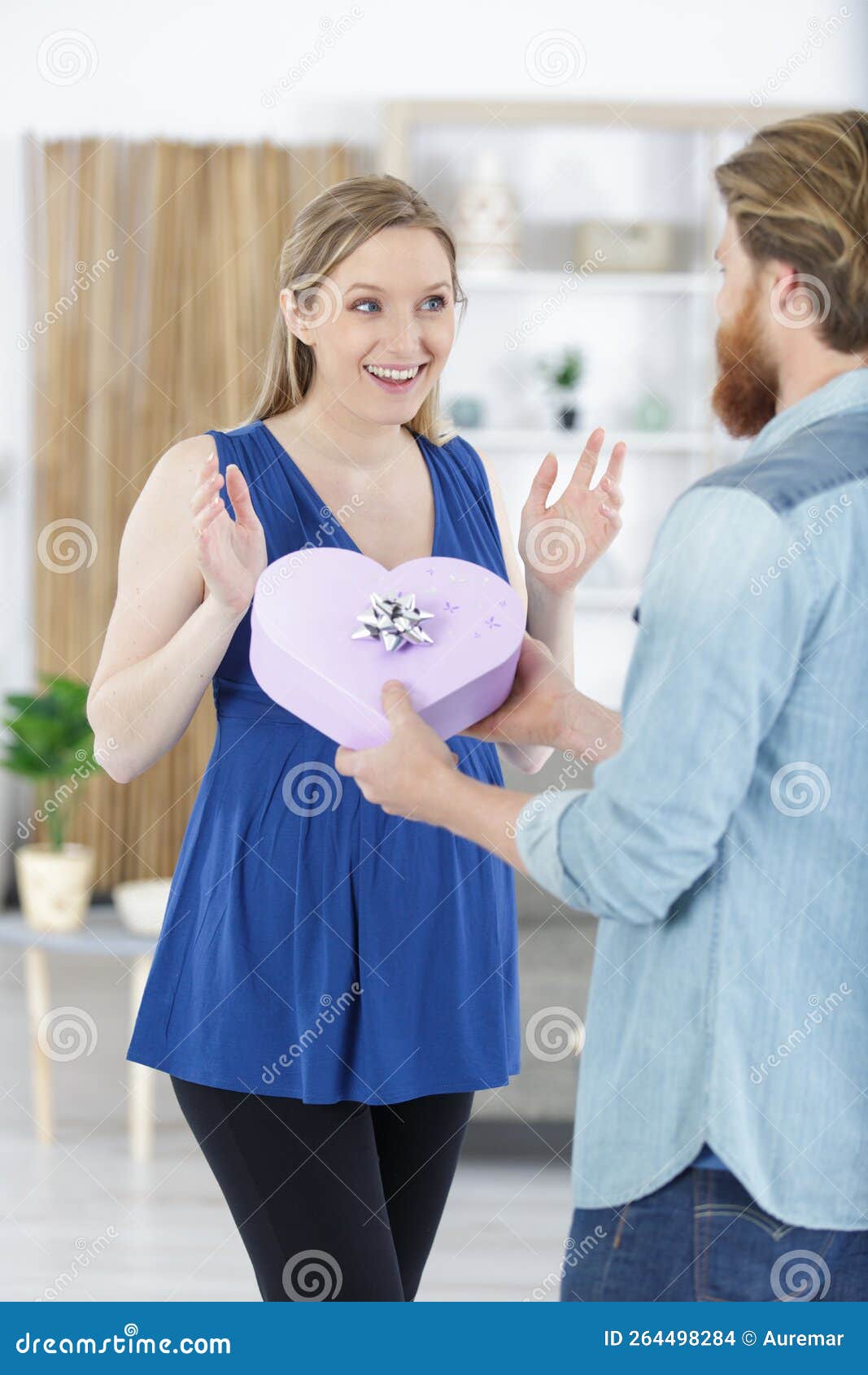 Happy Young Woman Receiving Present Stock Photo - Image of medicine ...