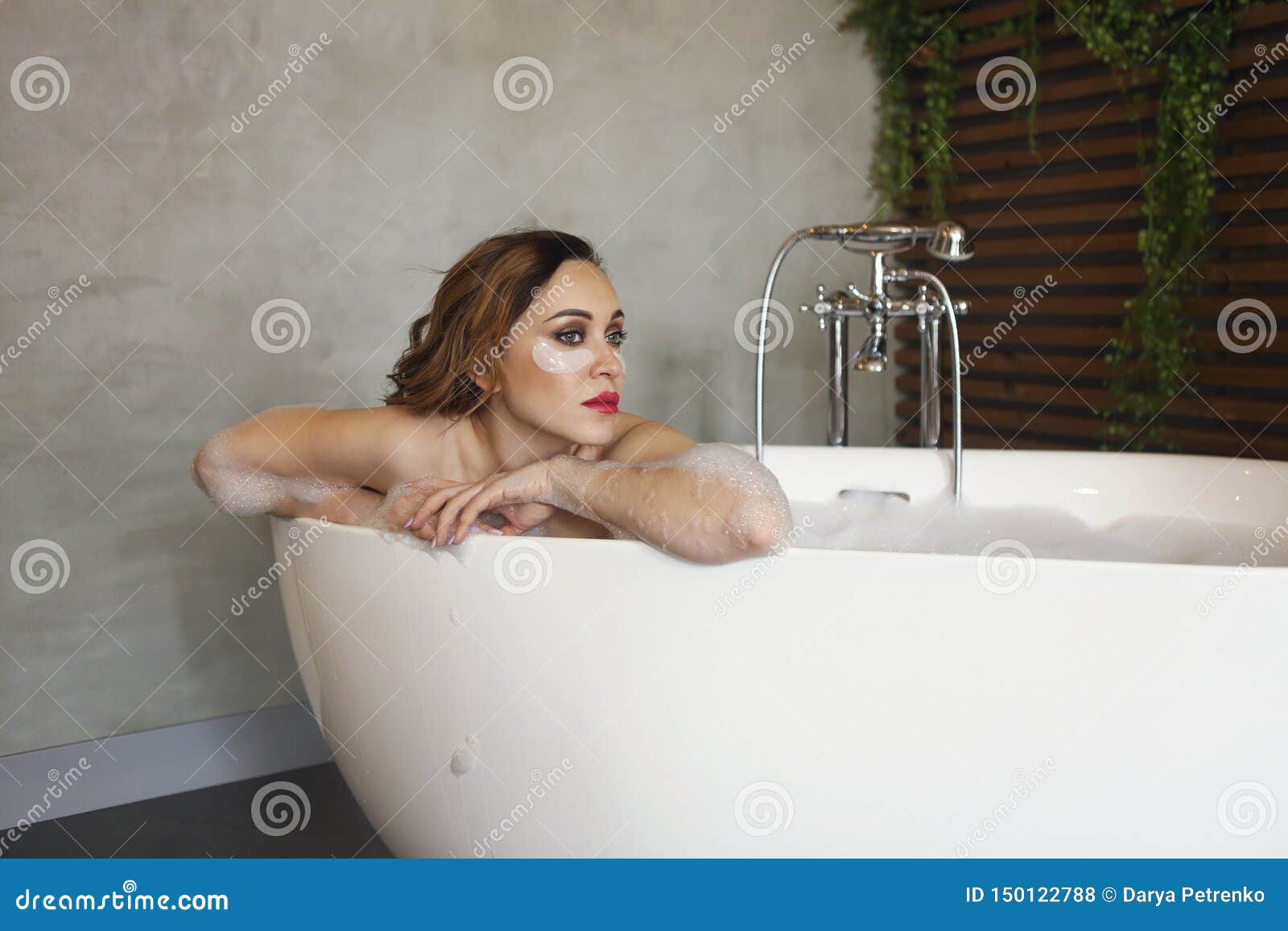 Happy Young Woman Relaxing in Bathtub Stock Photo - Image of cleansing ... Happy Young Woman Relaxing in Bathtub Stock Photo - Image of cleansing ...