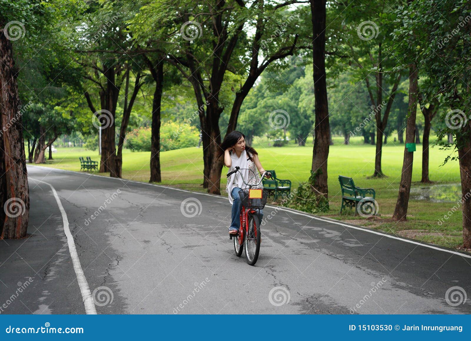 Happy Young Woman Relaxing Over Bicycle Stock Photo - Image of activity ...