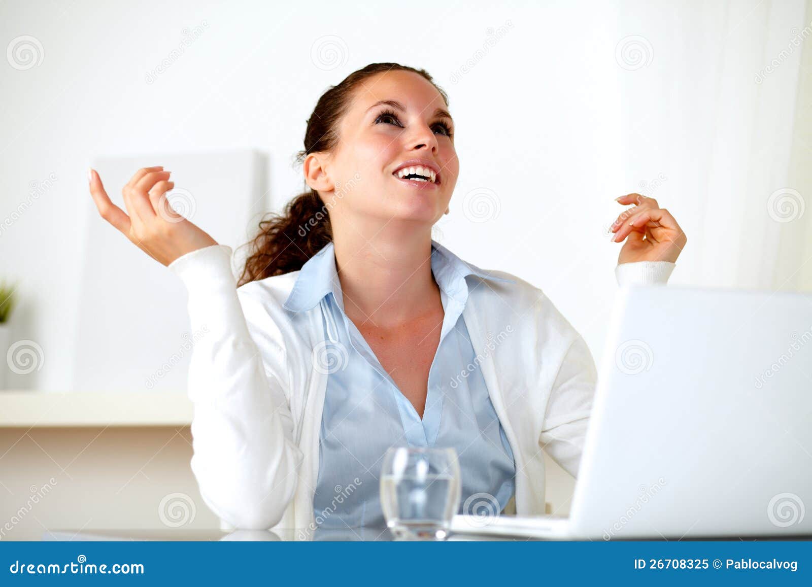 Happy Young Woman Smiling and Looking Up Stock Image - Image of desk ...