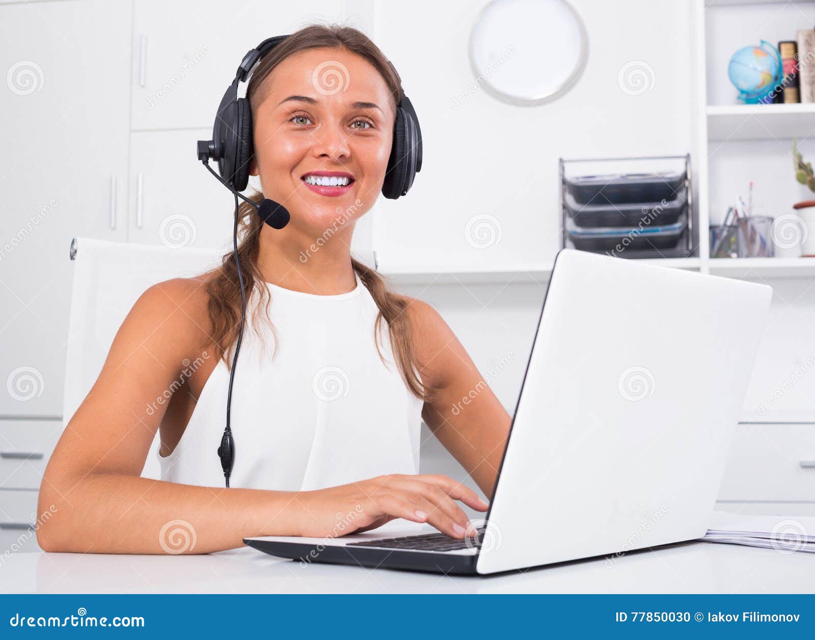 Happy Young Woman Using Headset at Call Center Stock Photo - Image of ...
