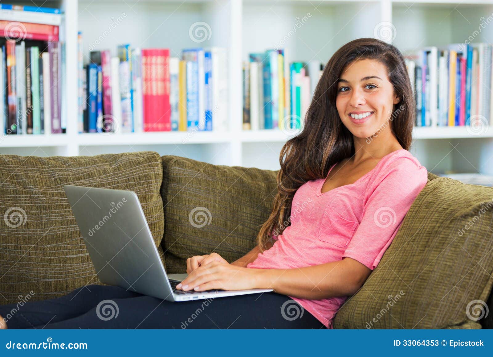 Happy Young Woman Using a Laptop Computer Stock Image - Image of couch ...