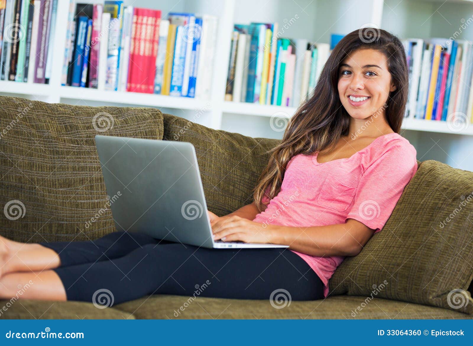 Happy Young Woman Using a Laptop Computer Stock Photo - Image of ...