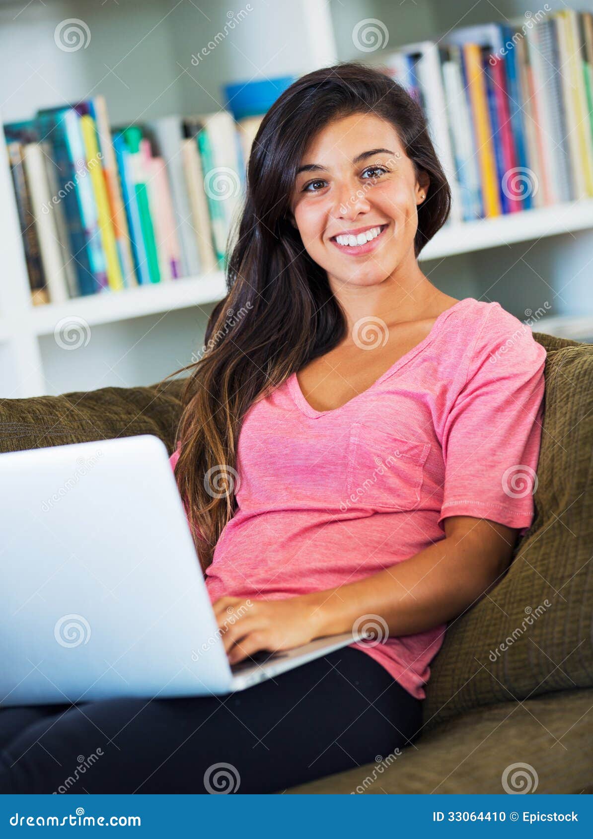 Happy Young Woman Using a Laptop Computer Stock Photo - Image of ...