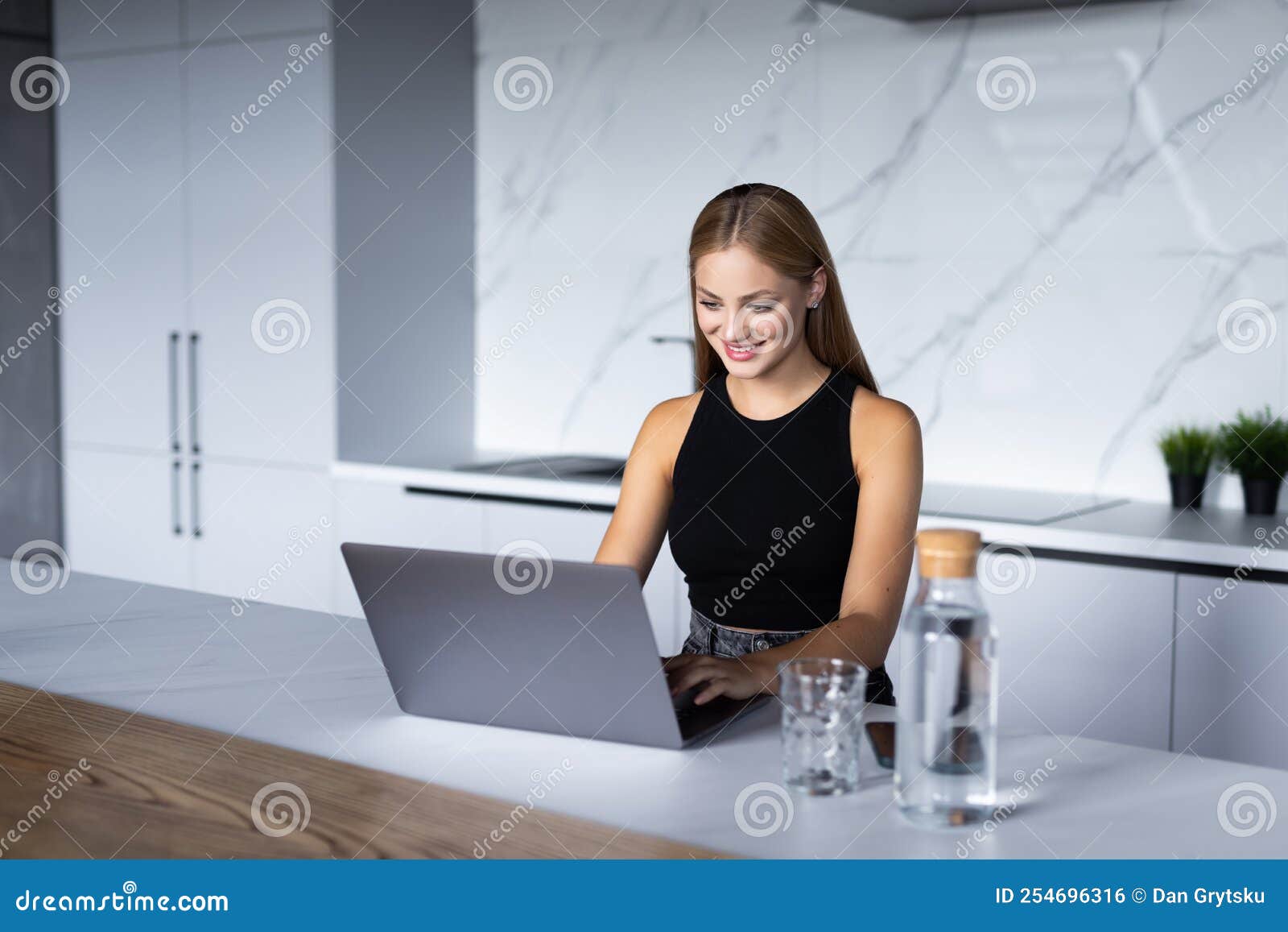 Happy Young Woman Using Laptop in Cook Room Stock Photo - Image of ...