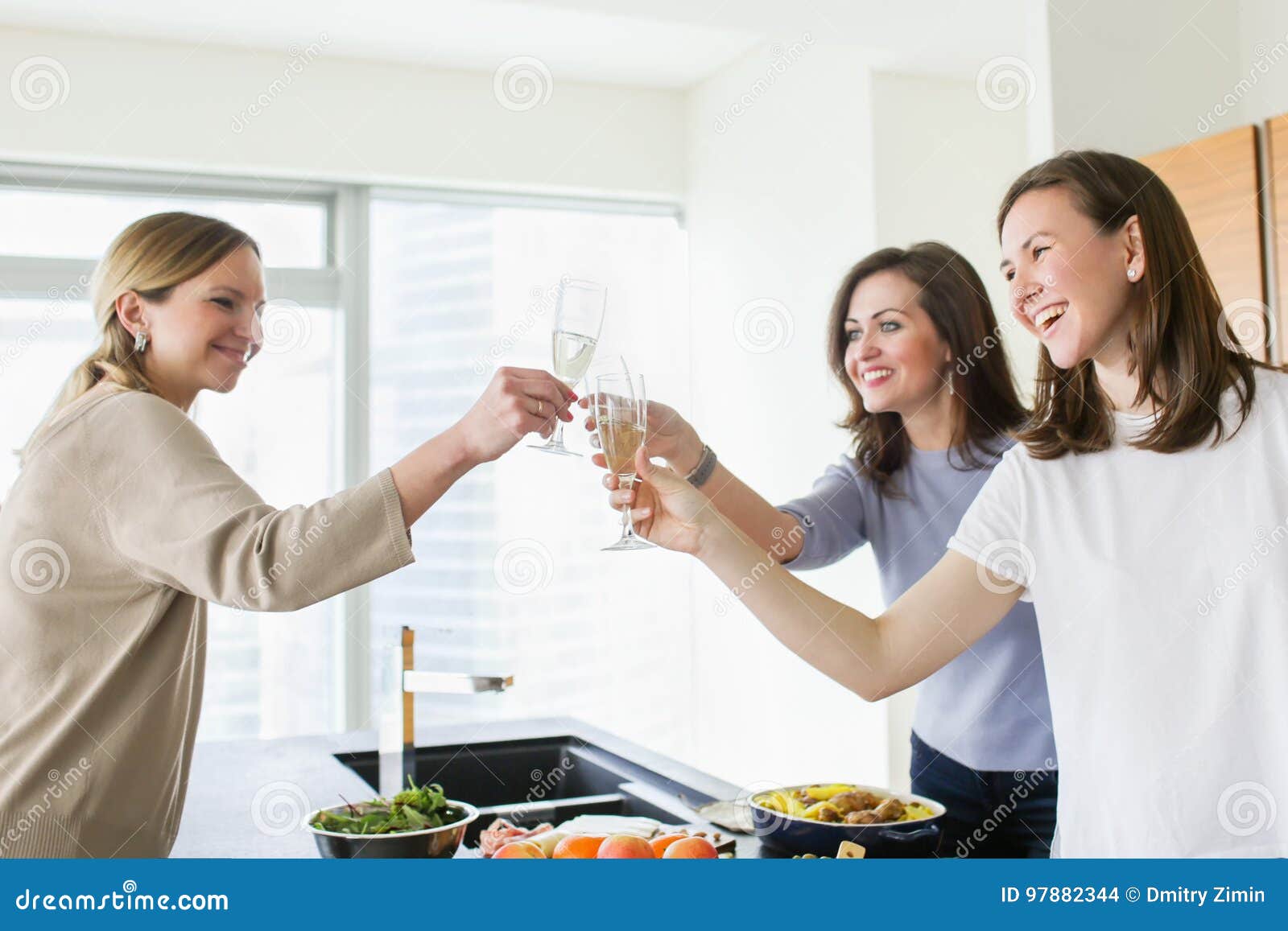 Happy Young Women Toasting with Champagne Stock Photo - Image of meet ...