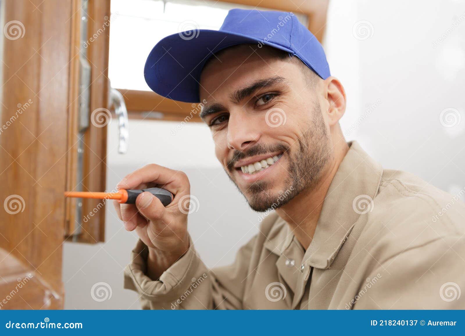 Happy Young Worker Fixing Window Stock Image - Image of home ...