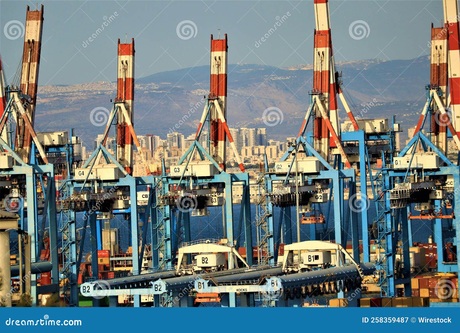 Harbor Cranes in the Industrial Port on a Sunny Day Editorial ...