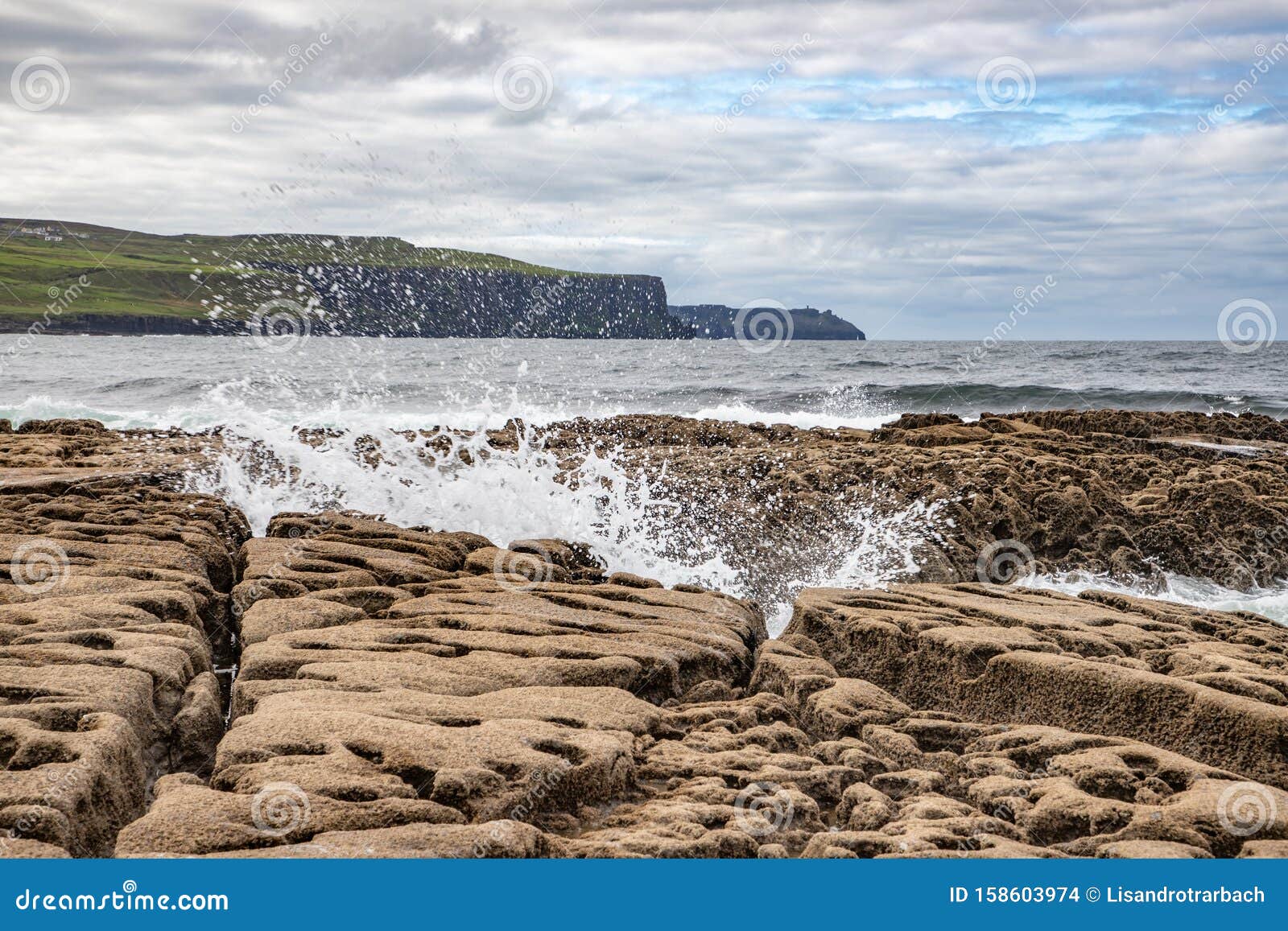 Harbour Beach with Waves and Cliffs of Moher in Background Stock Photo ...