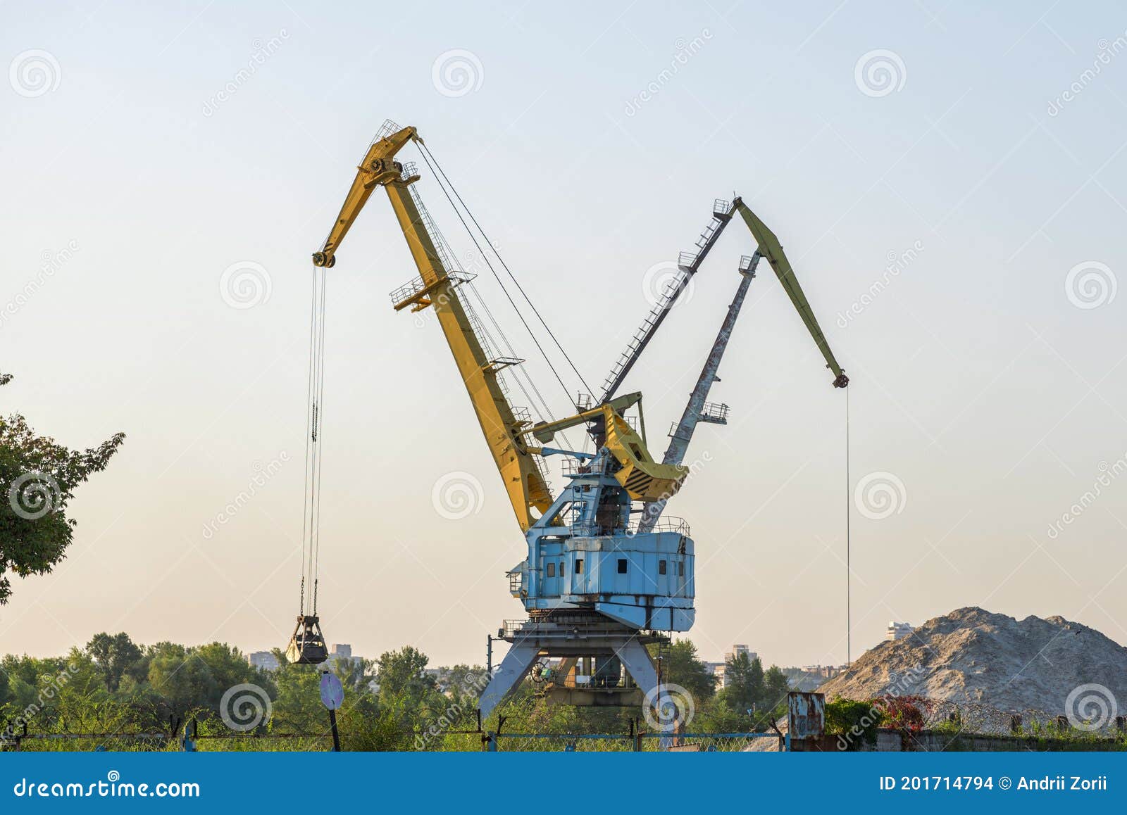 Harbour Cranes are Loading Sand and Gravel on a Barge. Loading ...