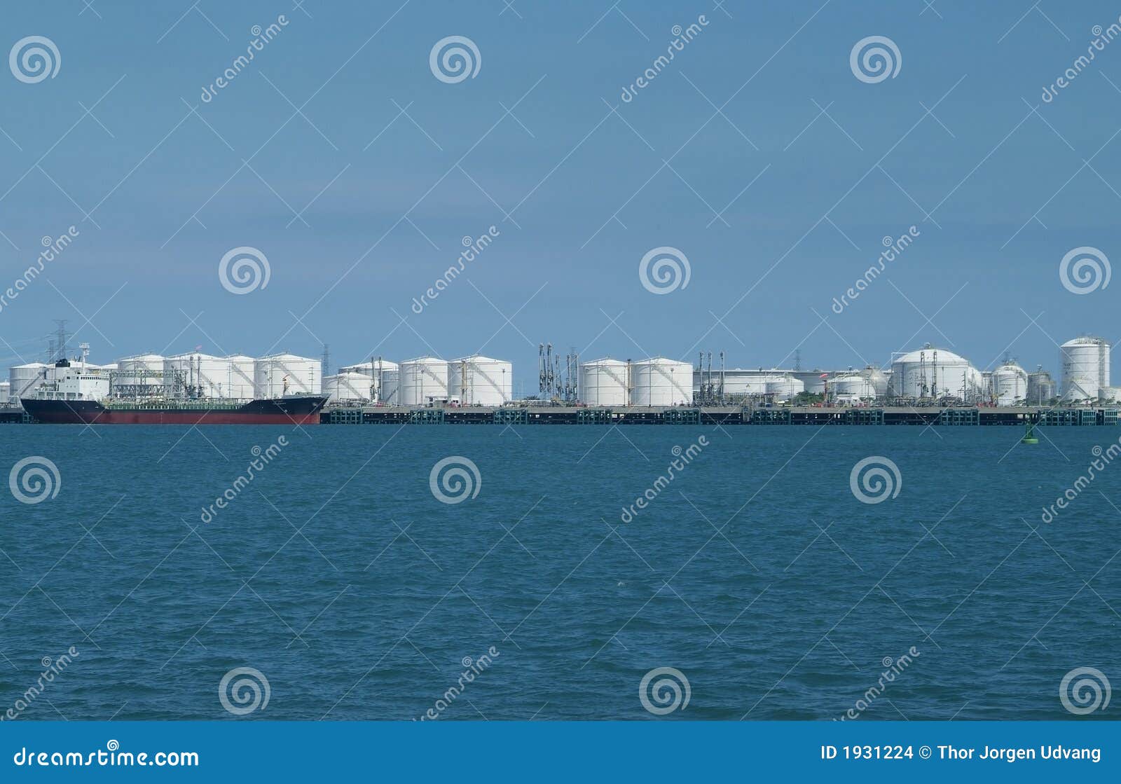 Harbour with storage tanks stock photo. Image of vessel - 1931224