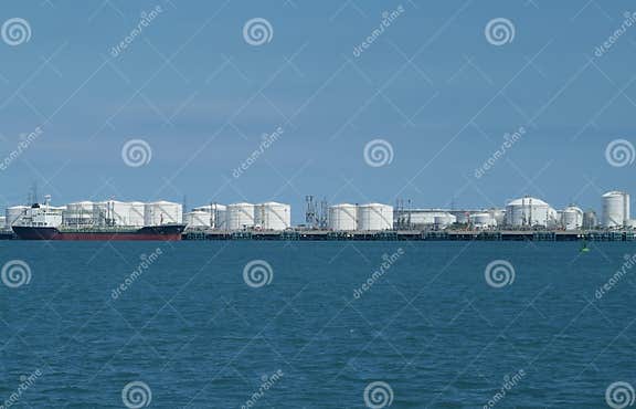 Harbour with storage tanks stock photo. Image of vessel - 1931224