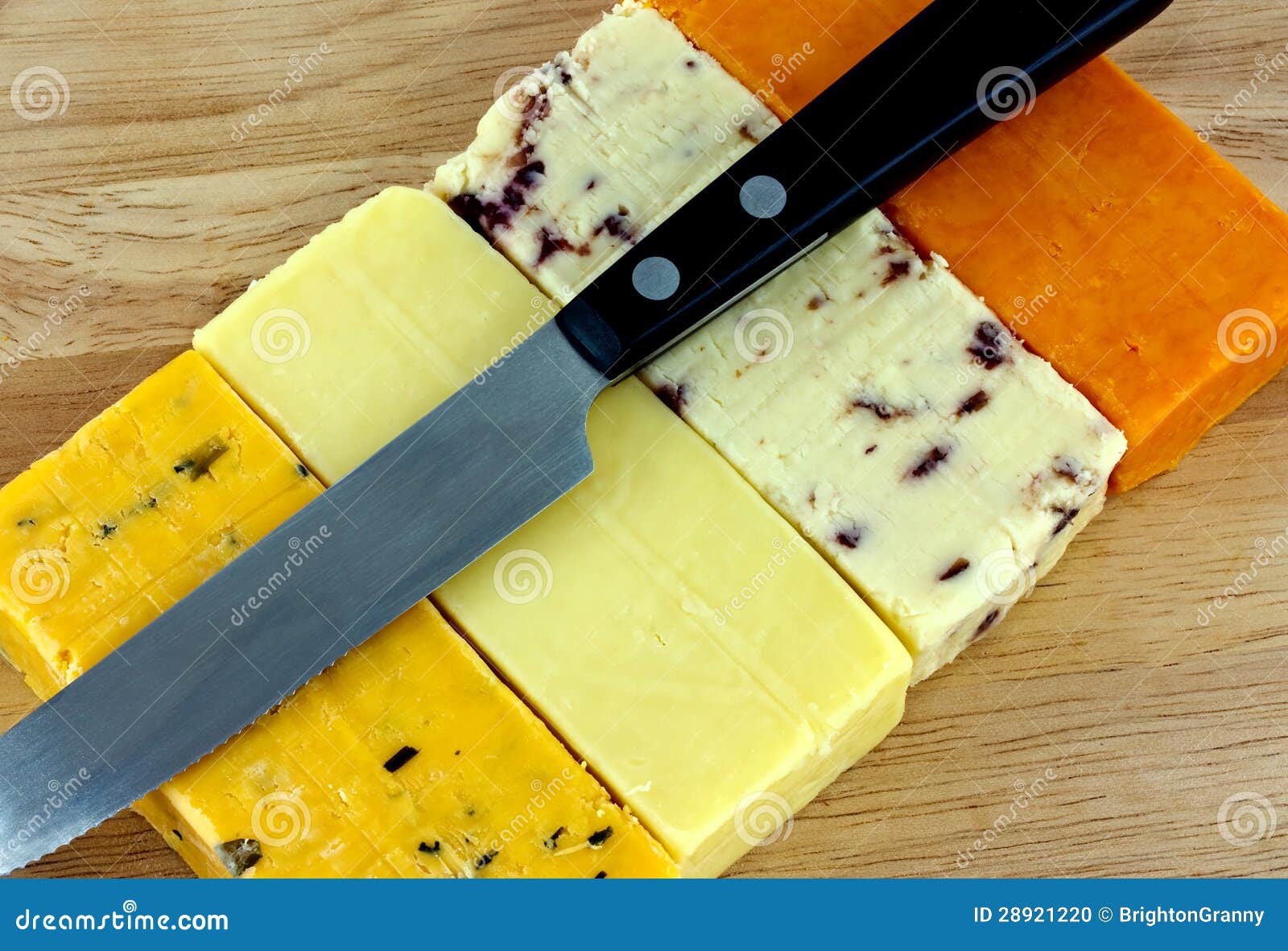 Four Types of Hard Cheese on a Wooden Board. Stock Photo - Image of ...