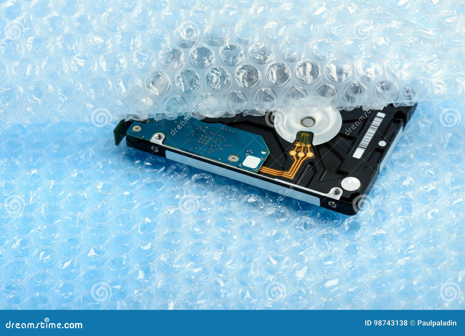 Hard disk in bubble wrap stock photo. Image of disk, pack - 98743138