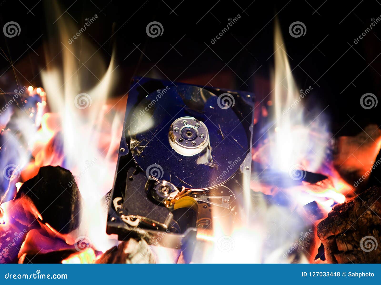 Hard Disk Drive in a Fire stock photo. Image of ignite - 127033448