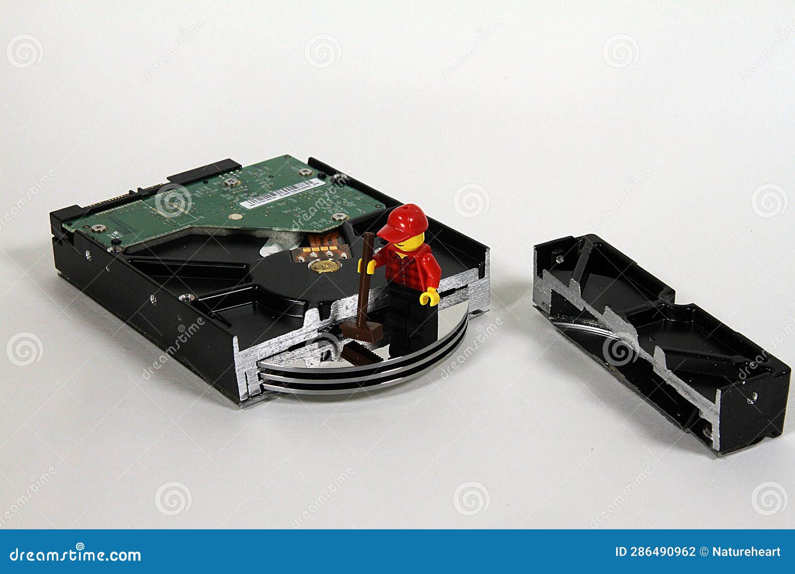 Miniature it Professionals Cleaning and Fixing Hard Drive Stock Photo ...