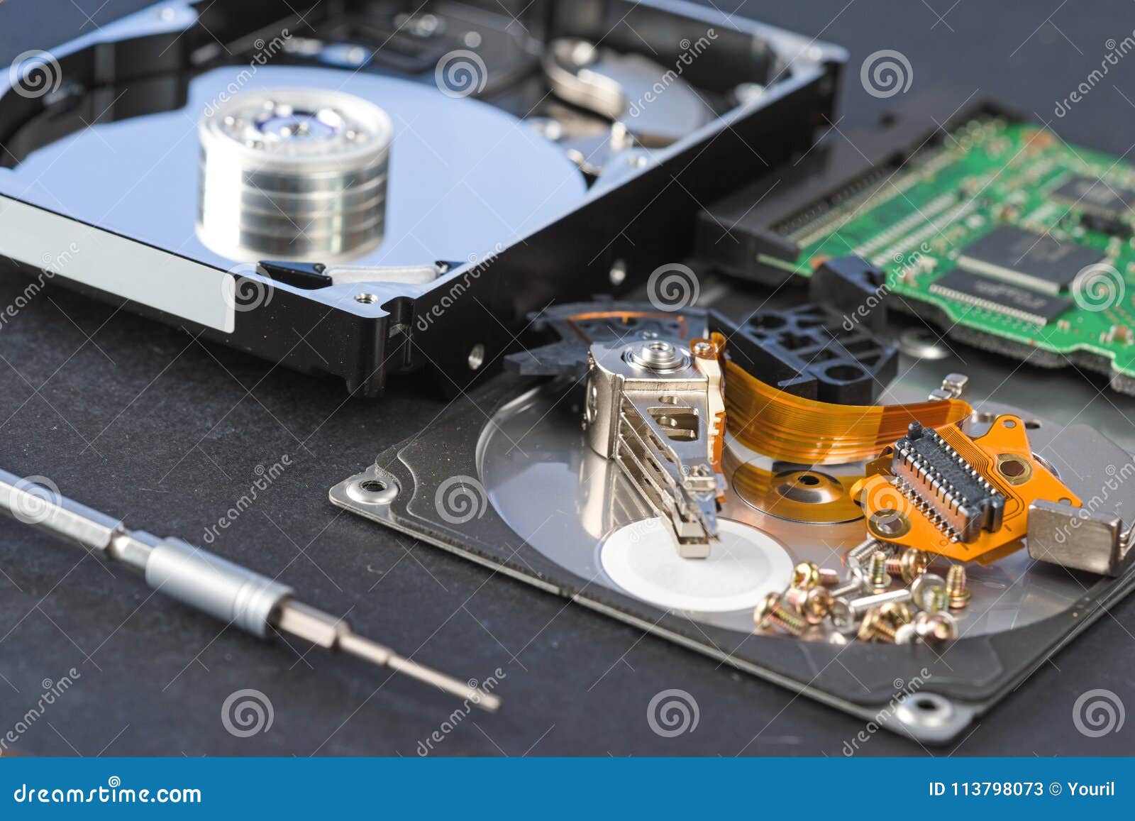 Disassembled Hard Disk Drive Inside Close-up, Spindle, Actuator Arm ...