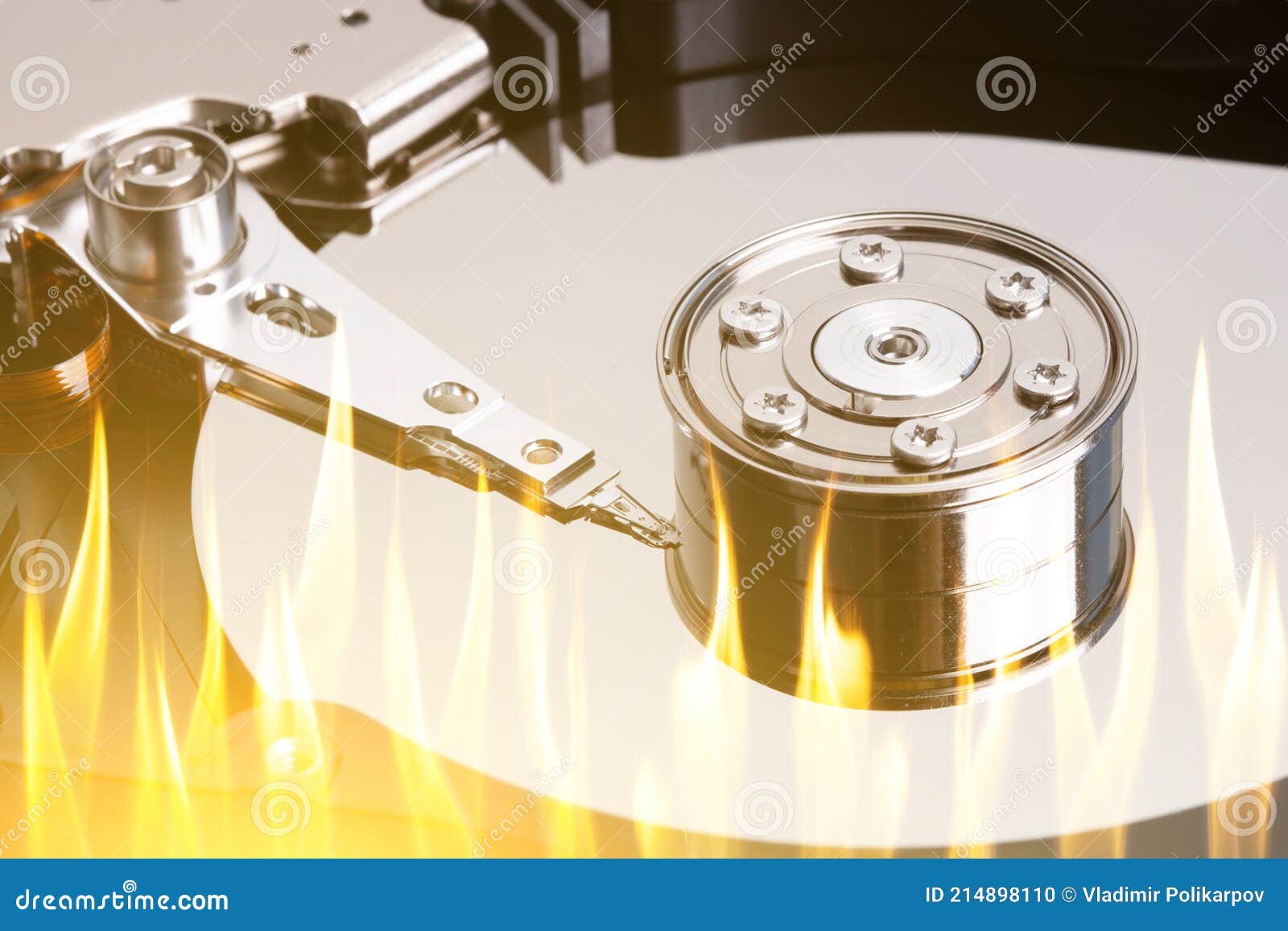 A Hard Disk with Flame Tongues. Burnt Disk in the Computer Stock Photo ...