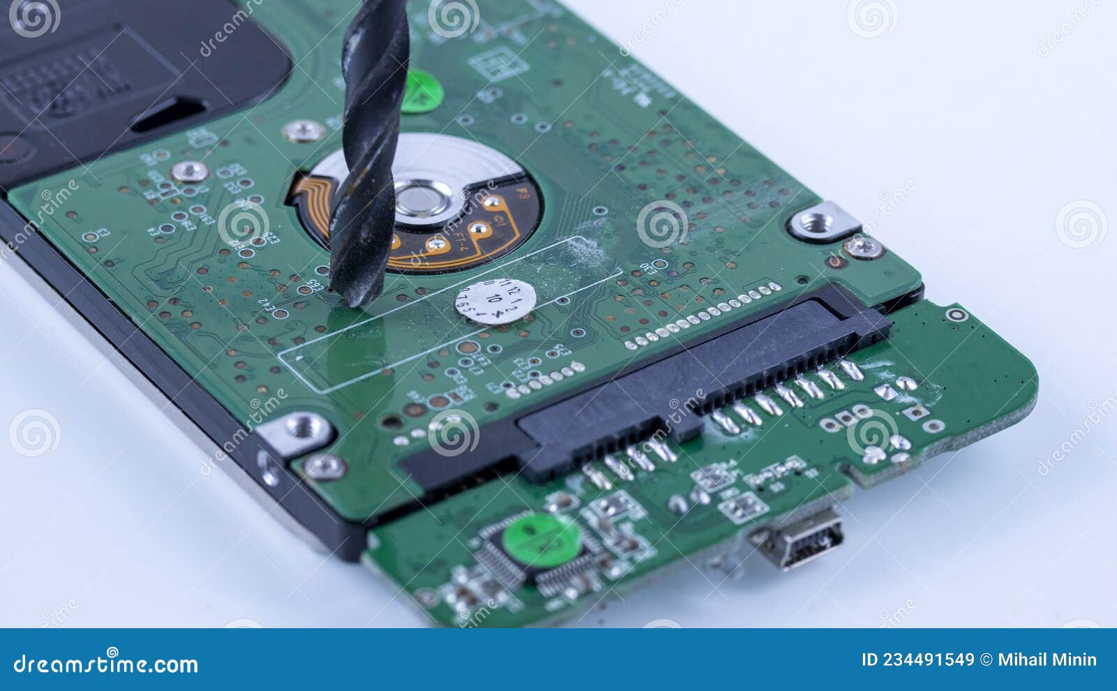 The Hard Drive from the Computer is Drilled with a Large Drill, Macro ...