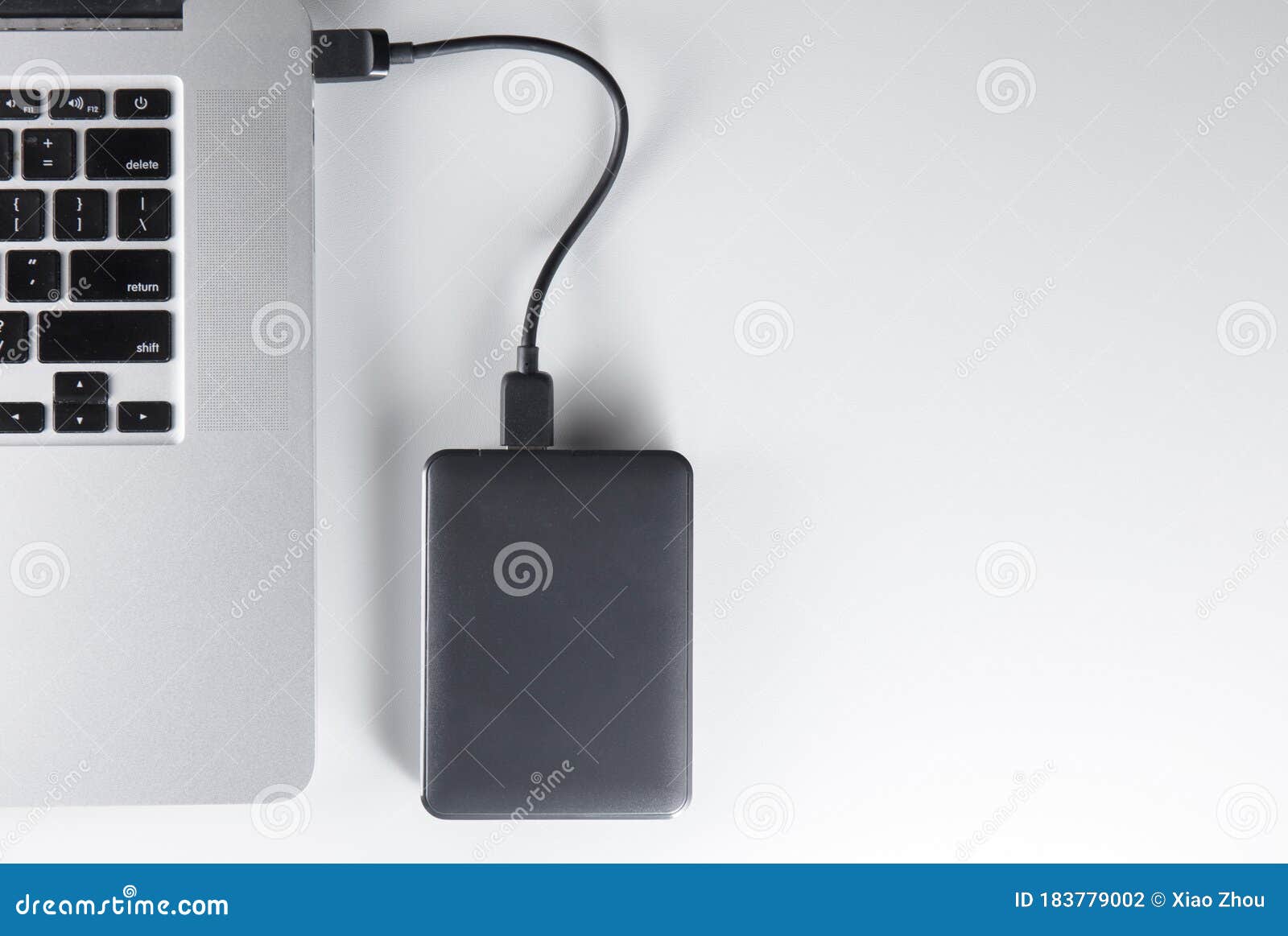 Hard drive and laptop stock photo. Image of storage - 183779002